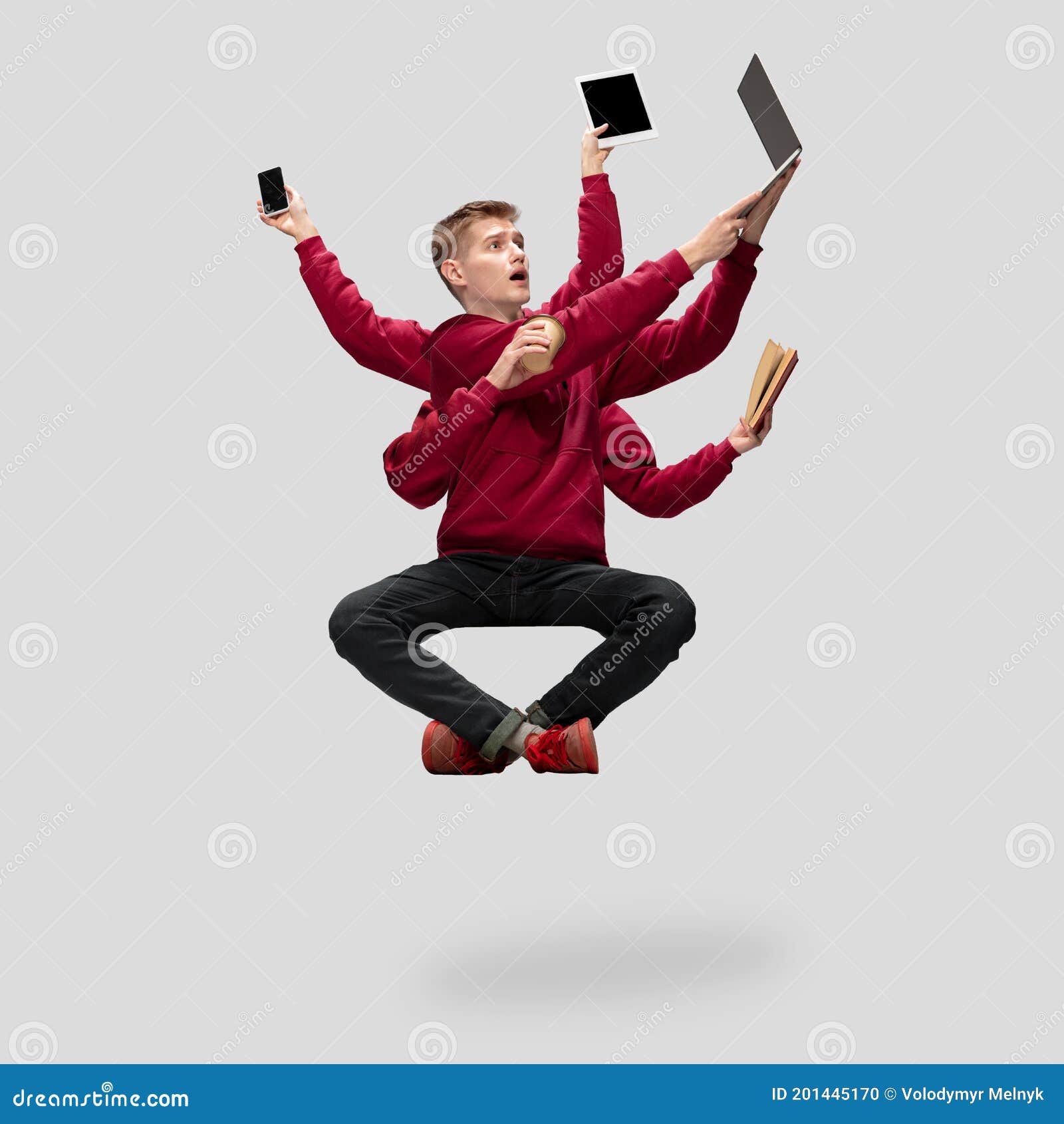 Handsome Multi-armed Student Levitating on Grey Studio Background with ...