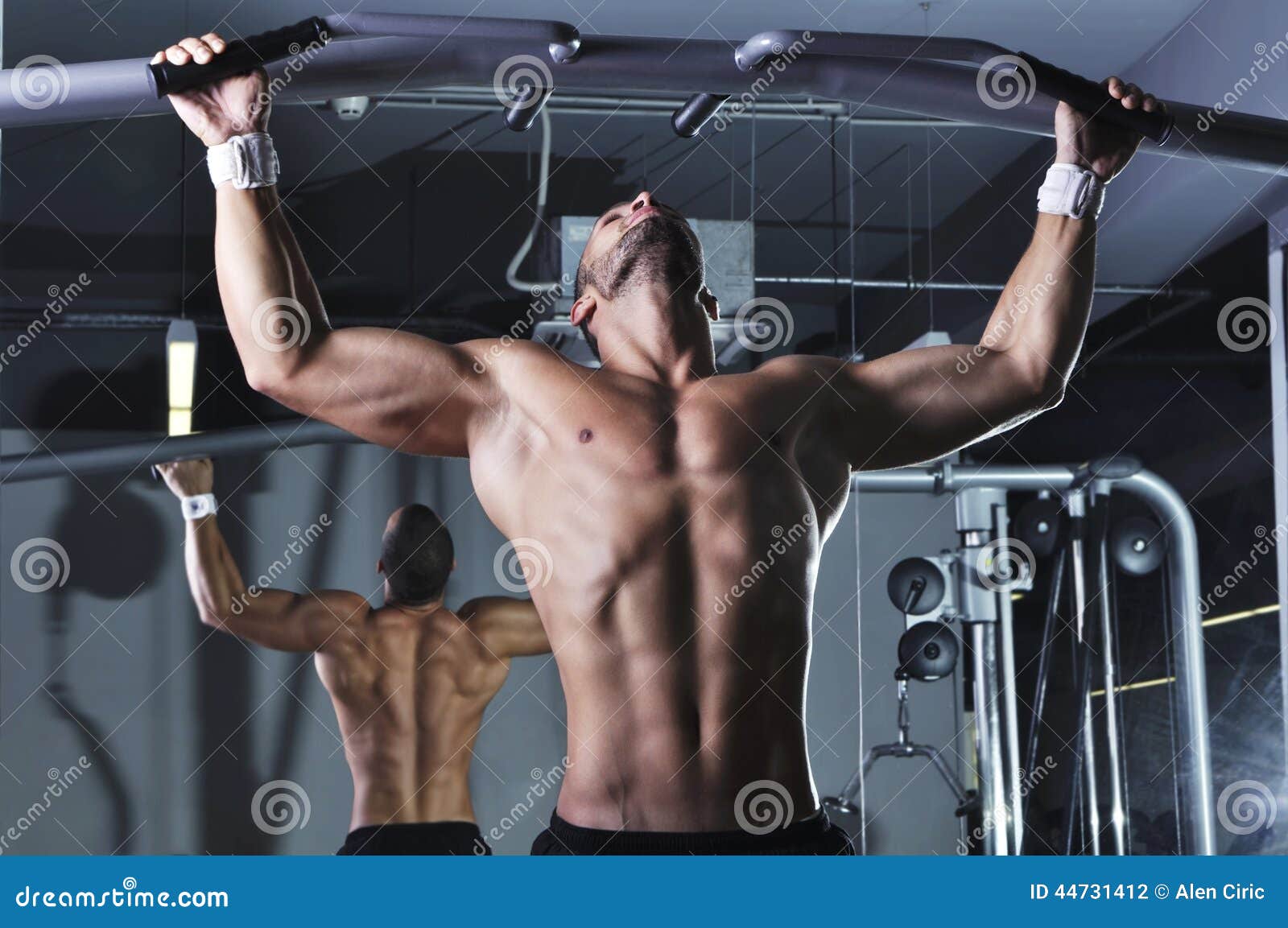 Handsome Muscular Male Model with Perfect Body Doing Pull Ups Stock ...