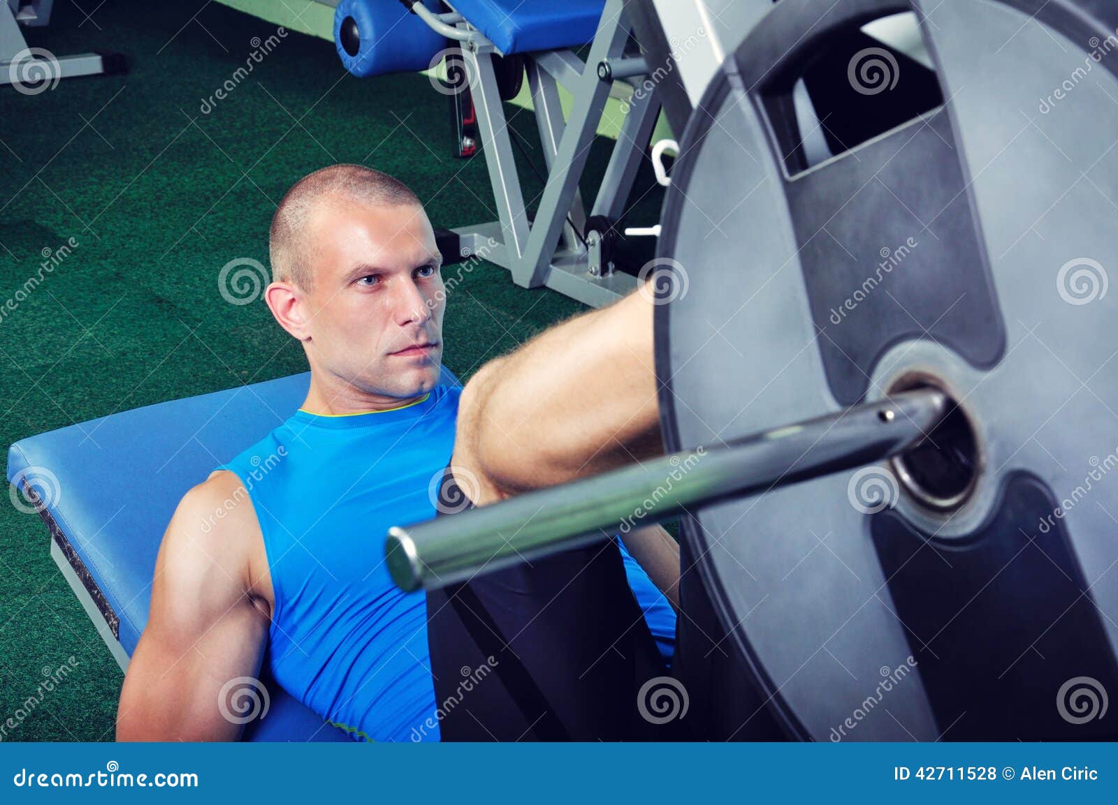 Handsome Muscular Man Exercising in a Gym Stock Photo - Image of ...