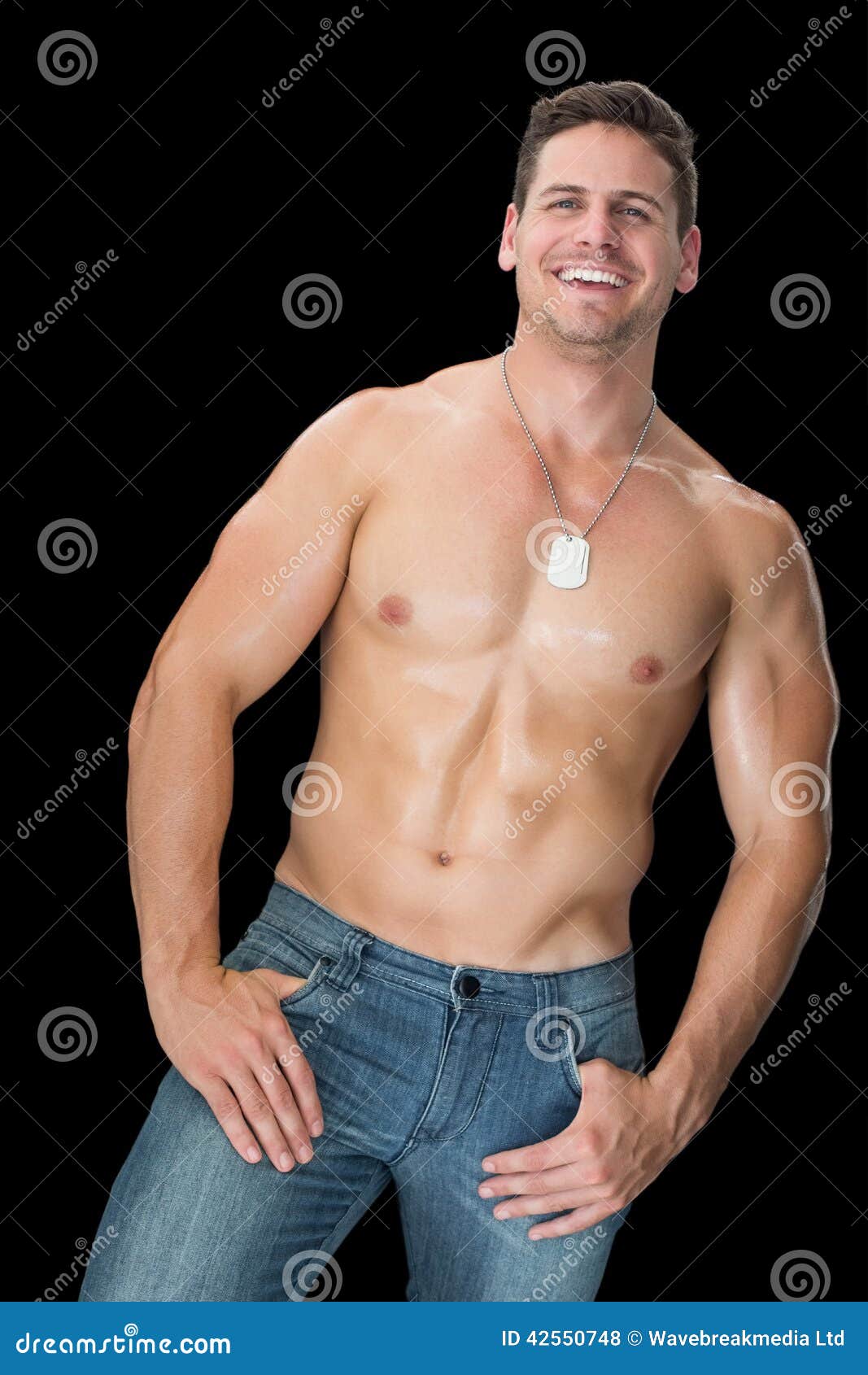Handsome Muscular Man Posing in Blue Jeans Smiling at Camera Stock ...