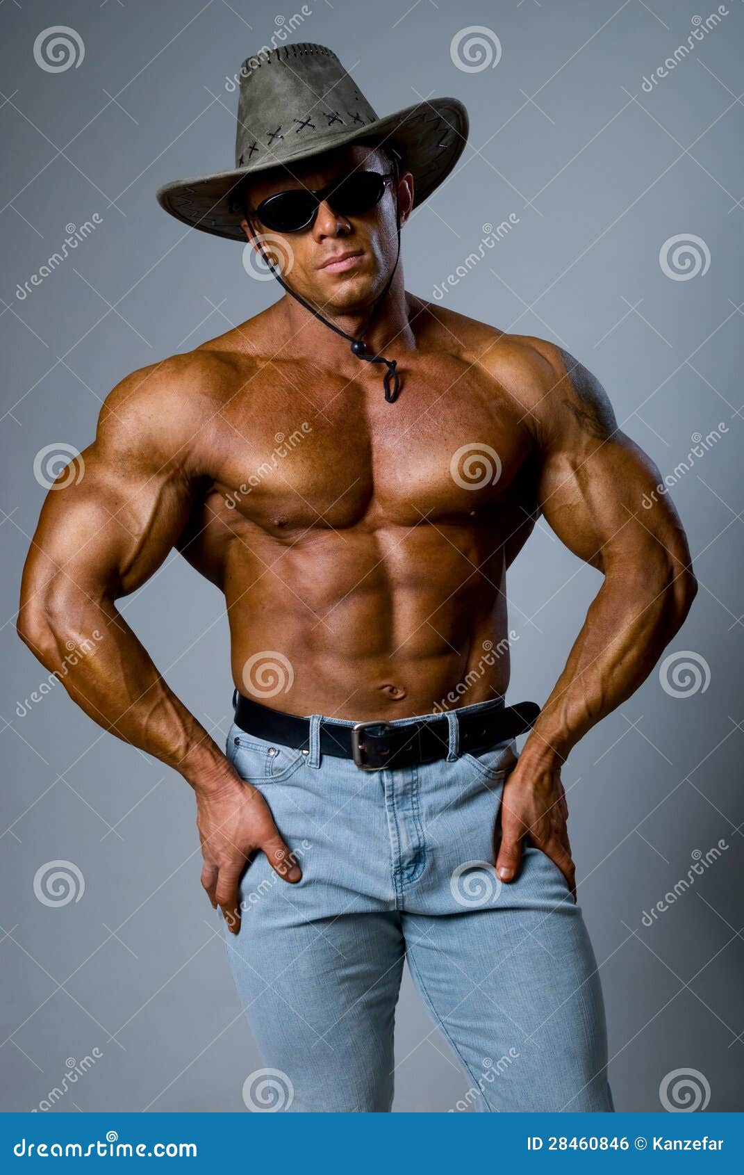 Handsome Muscular Man Wearing a Hat and Sunglasses Stock Photo - Image ...