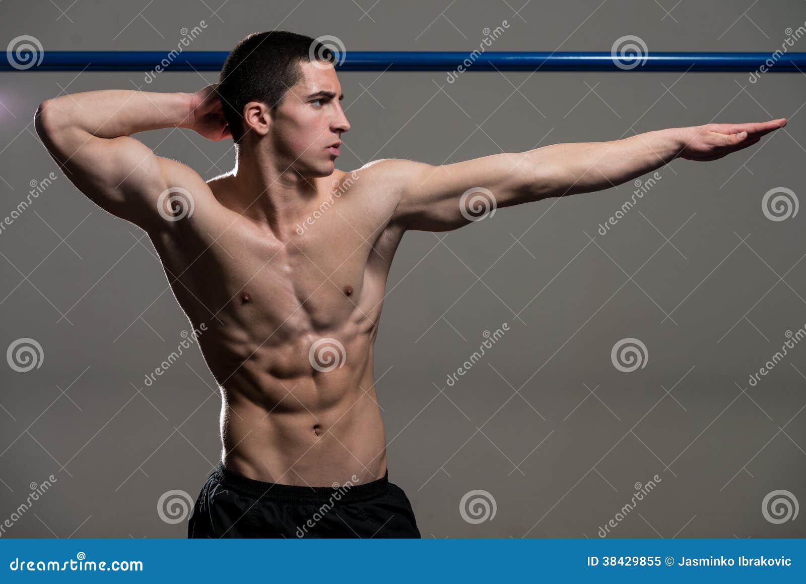 Handsome Muscular Men stock image. Image of indoors, conscious - 38429855