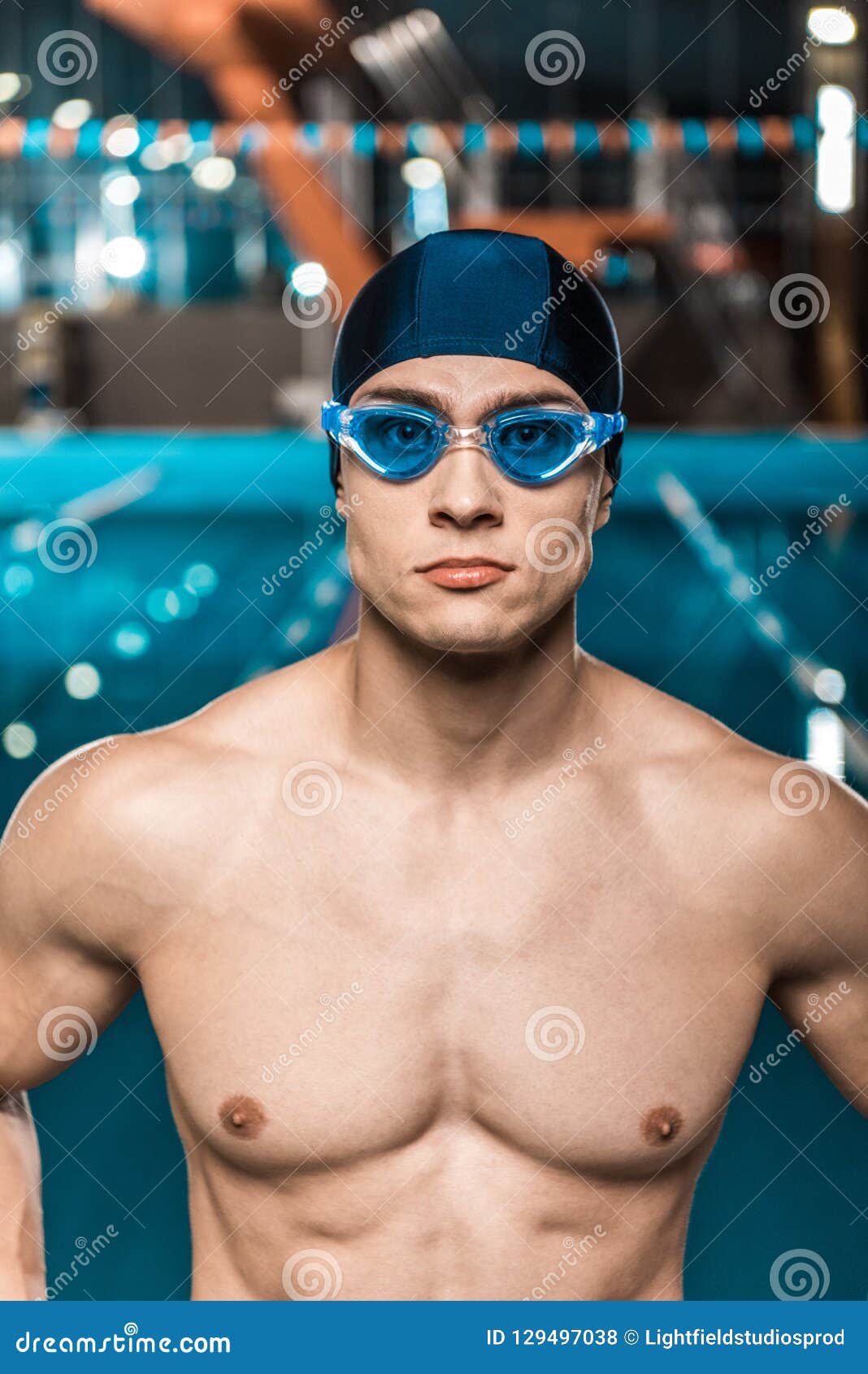 Handsome Muscular Swimmer in Swimming Cap Stock Photo - Image of torso ...