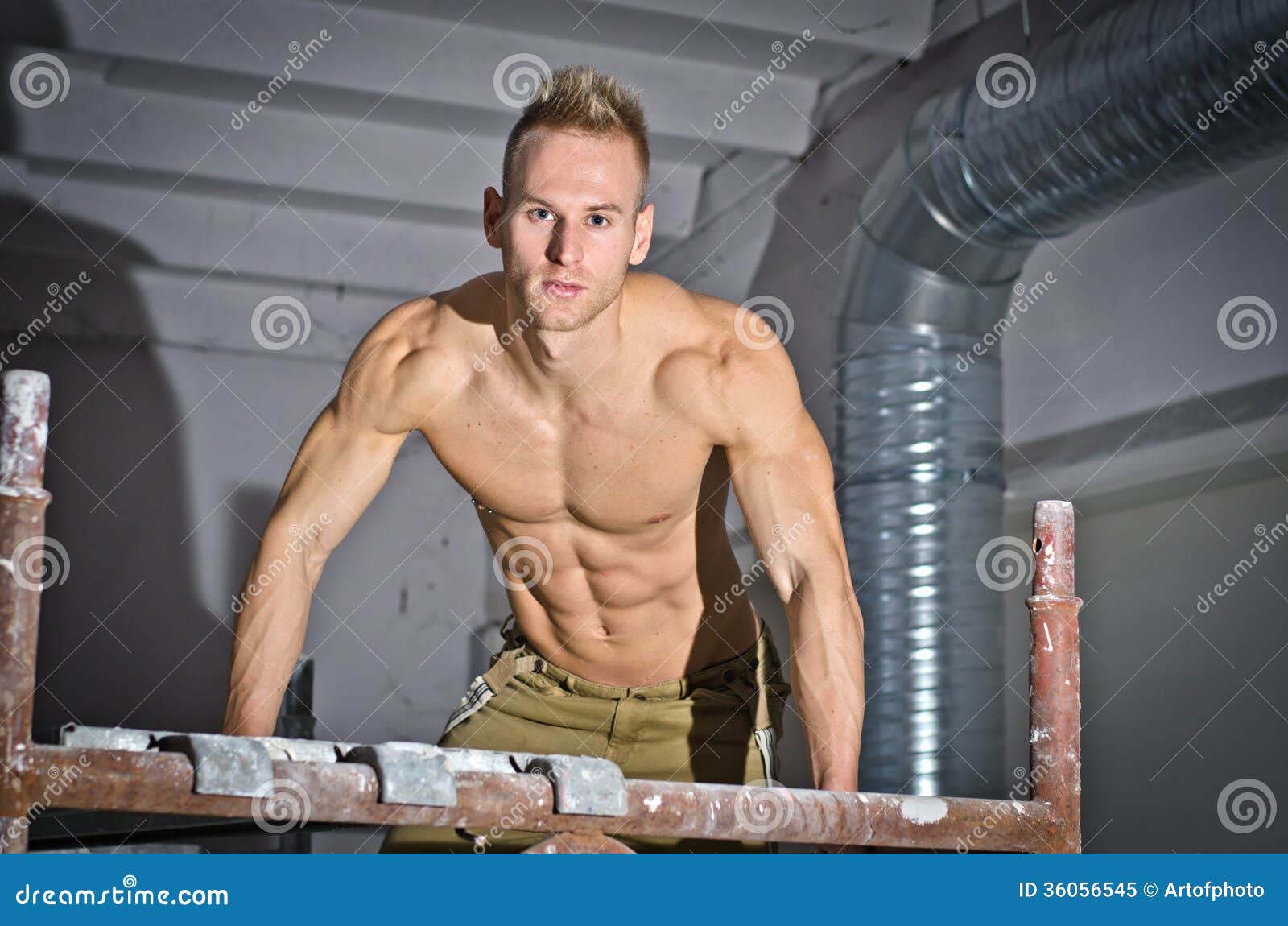Handsome, Muscular Young Construction Worker Climbing Scaffolding Stock ...