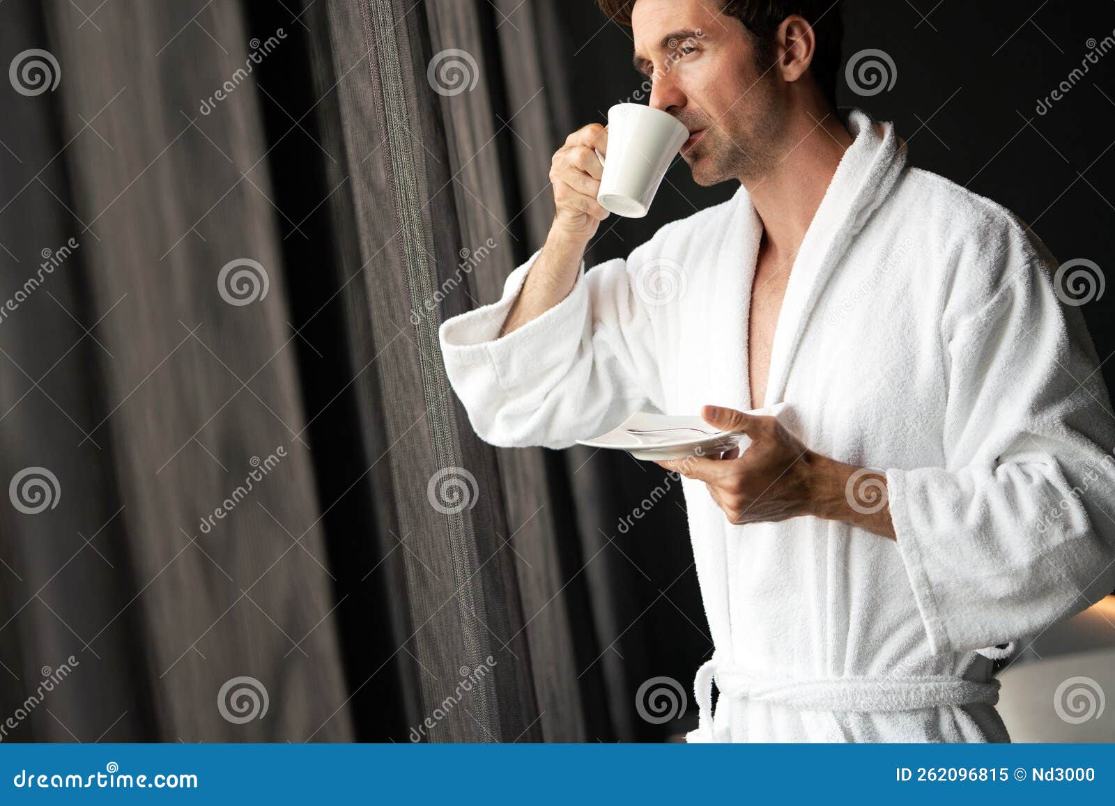 Handsome, Muscular, Young Man Drinking His Morning Coffee in a Hotel ... Handsome, Muscular, Young Man Drinking His Morning Coffee in a Hotel ...