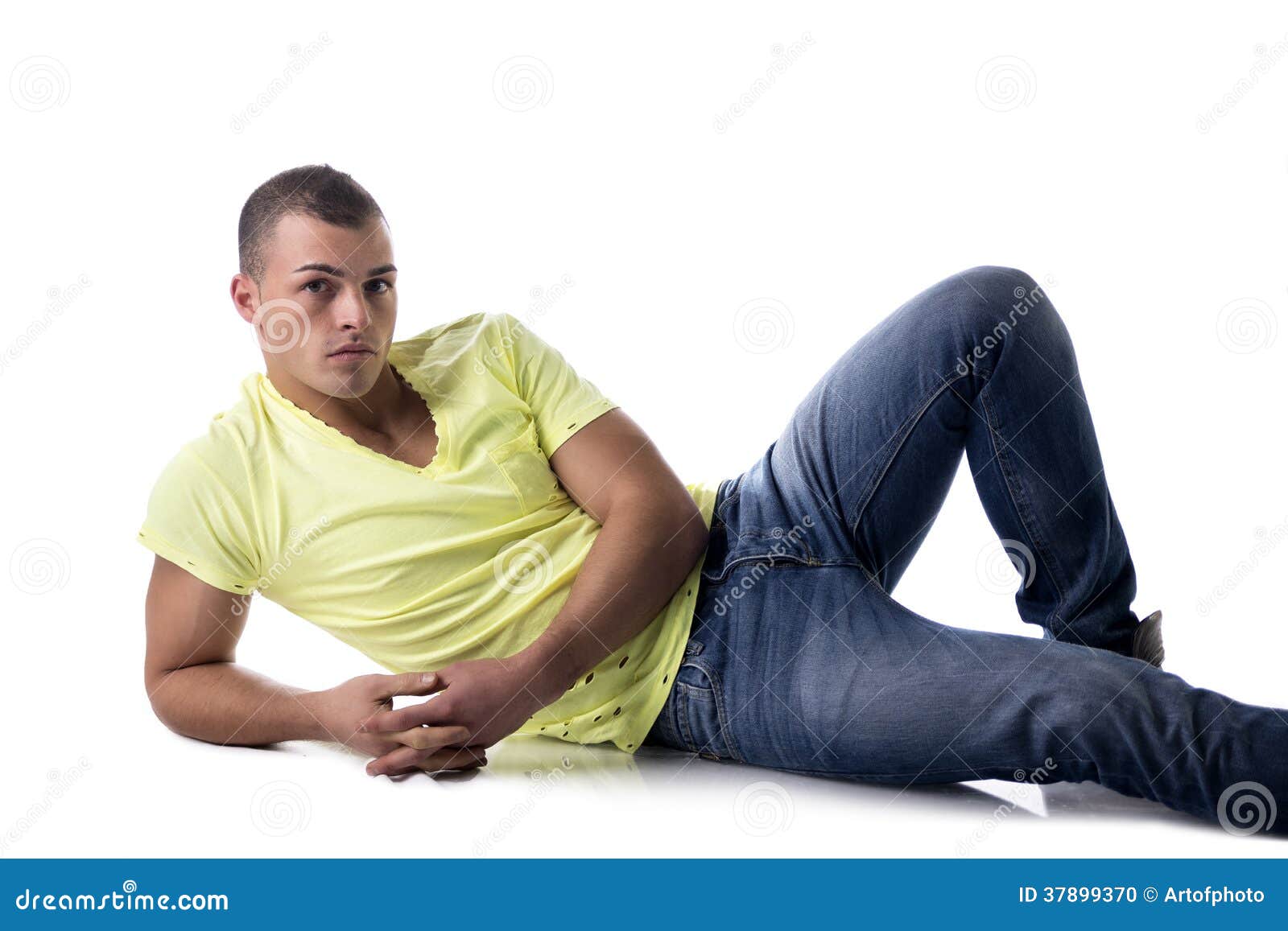 Handsome, Muscular Young Man Lying on the Floor Stock Photo - Image of ...