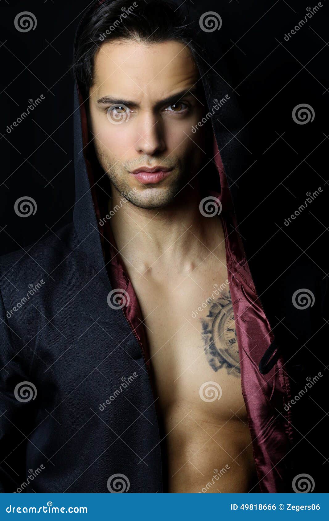 Handsome Mysterious Man with a Tattoo Stock Photo - Image of fashion, sacopy: 49818666