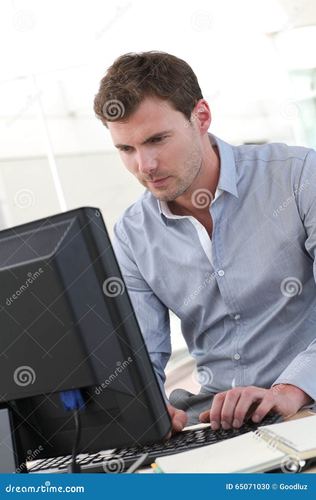 Handsome Office Worker Working on Computer Stock Photo - Image of ...