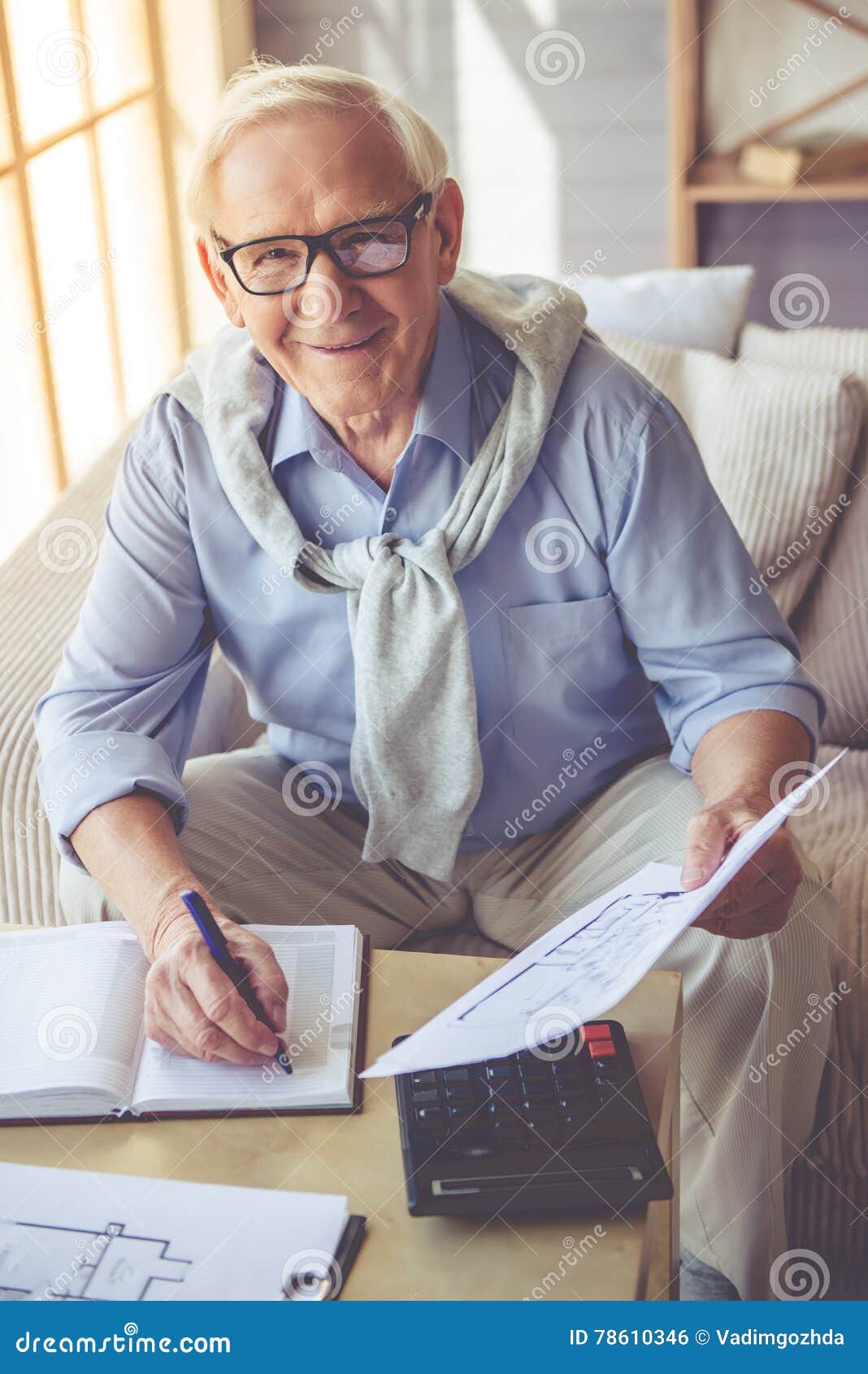 Handsome old man at home stock photo. Image of architect - 78610346