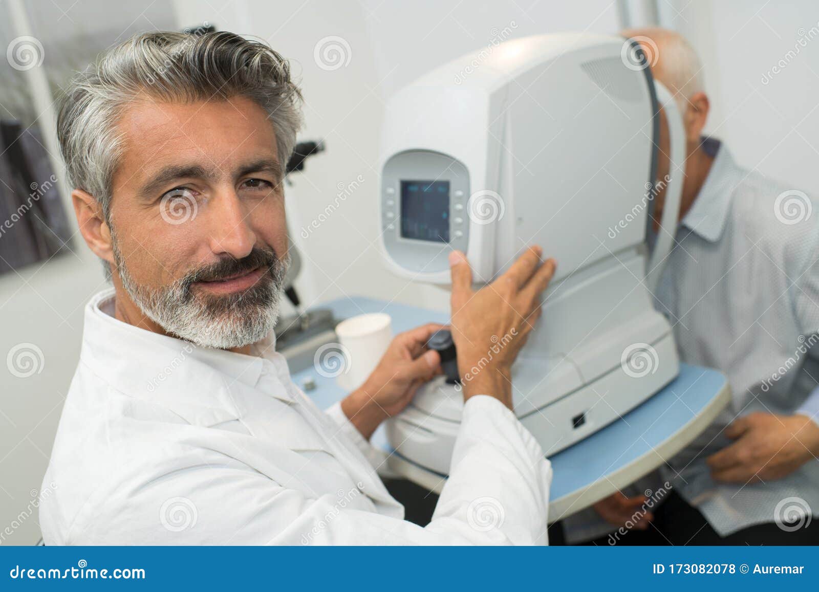 Handsome Optometrist during Consultation in Ophthalmology Clinic Stock ...