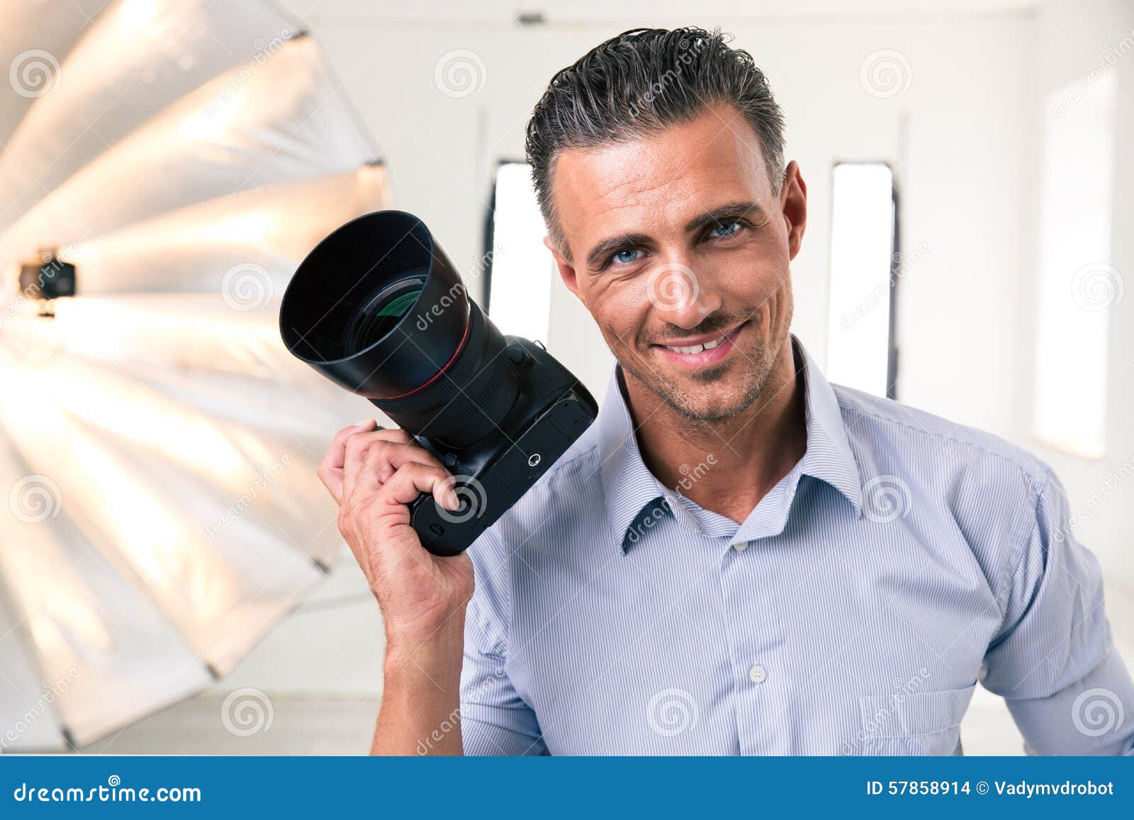 Handsome Photographer Holding Camera Stock Photo - Image of start ...