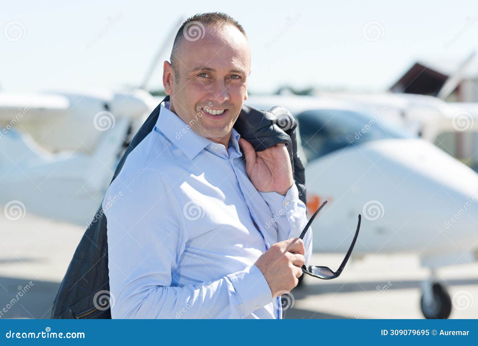 Handsome Pilot in Aviation Looking at Camera Stock Image - Image of ...