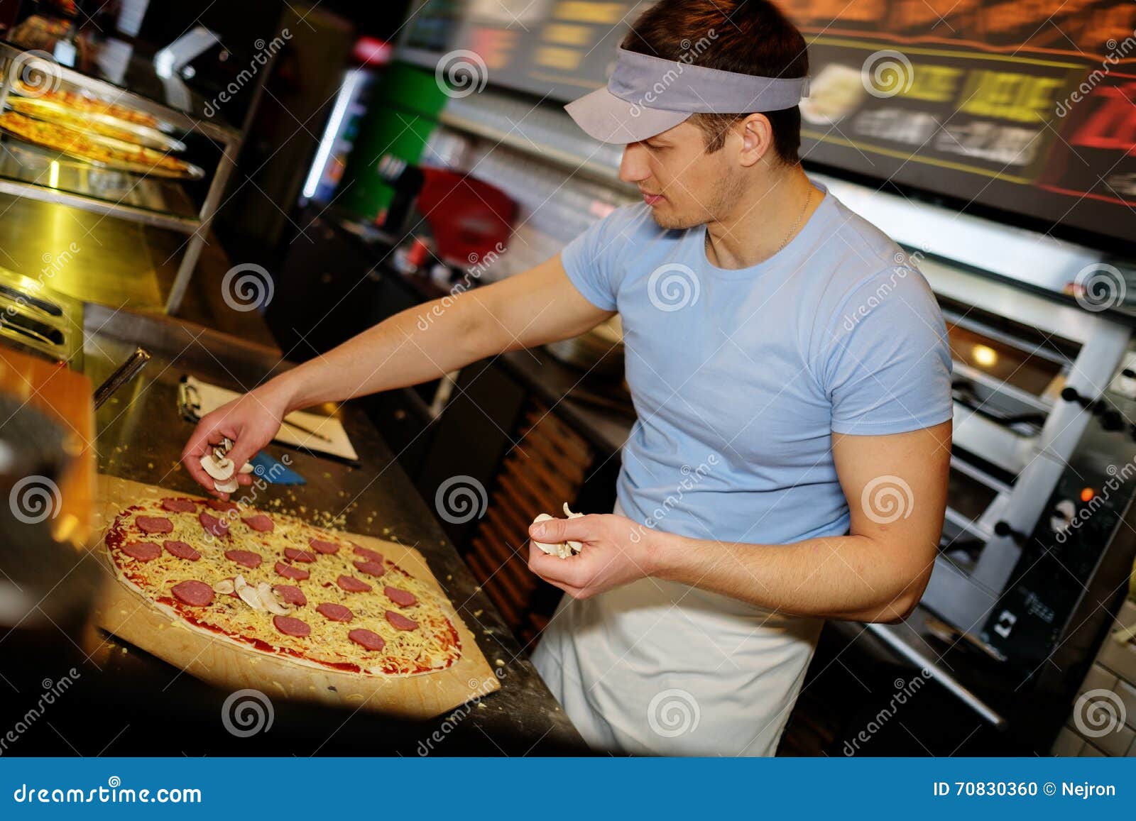 Handsome Pizzaiolo Making Pizza at Kitchen in Pizzeria. Stock Photo ...