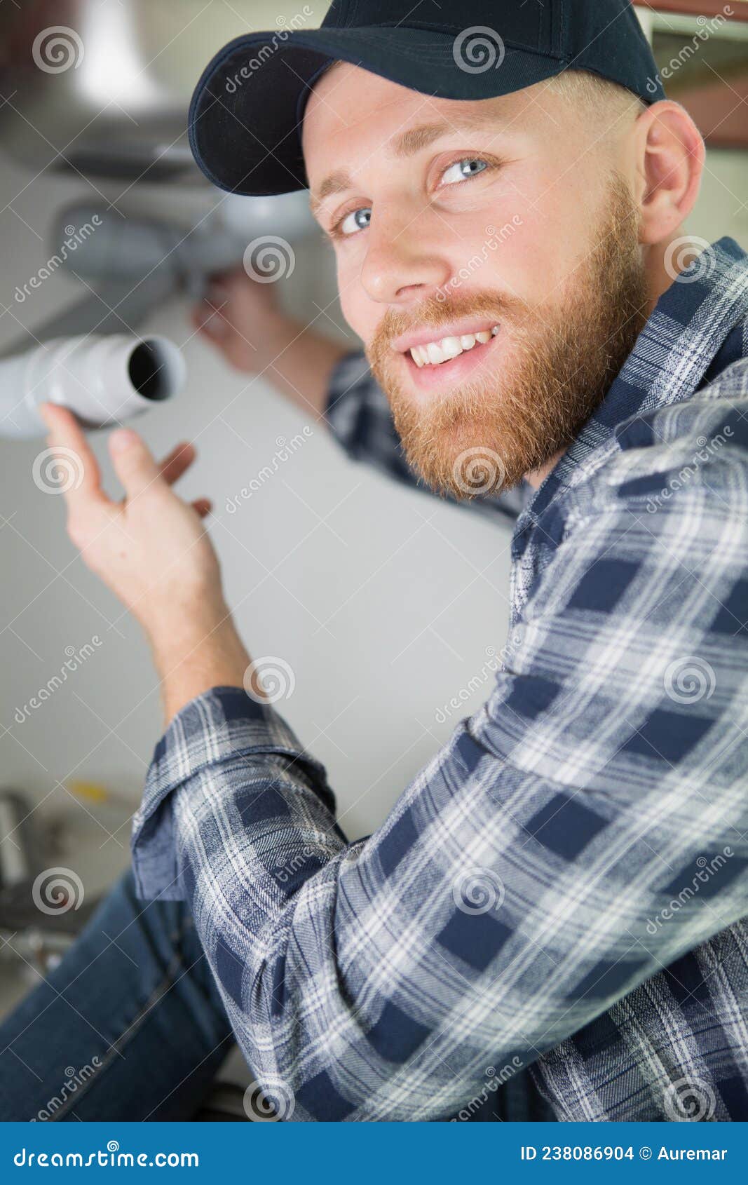 Handsome Plumber Smiling at Camera Stock Photo - Image of interior ...
