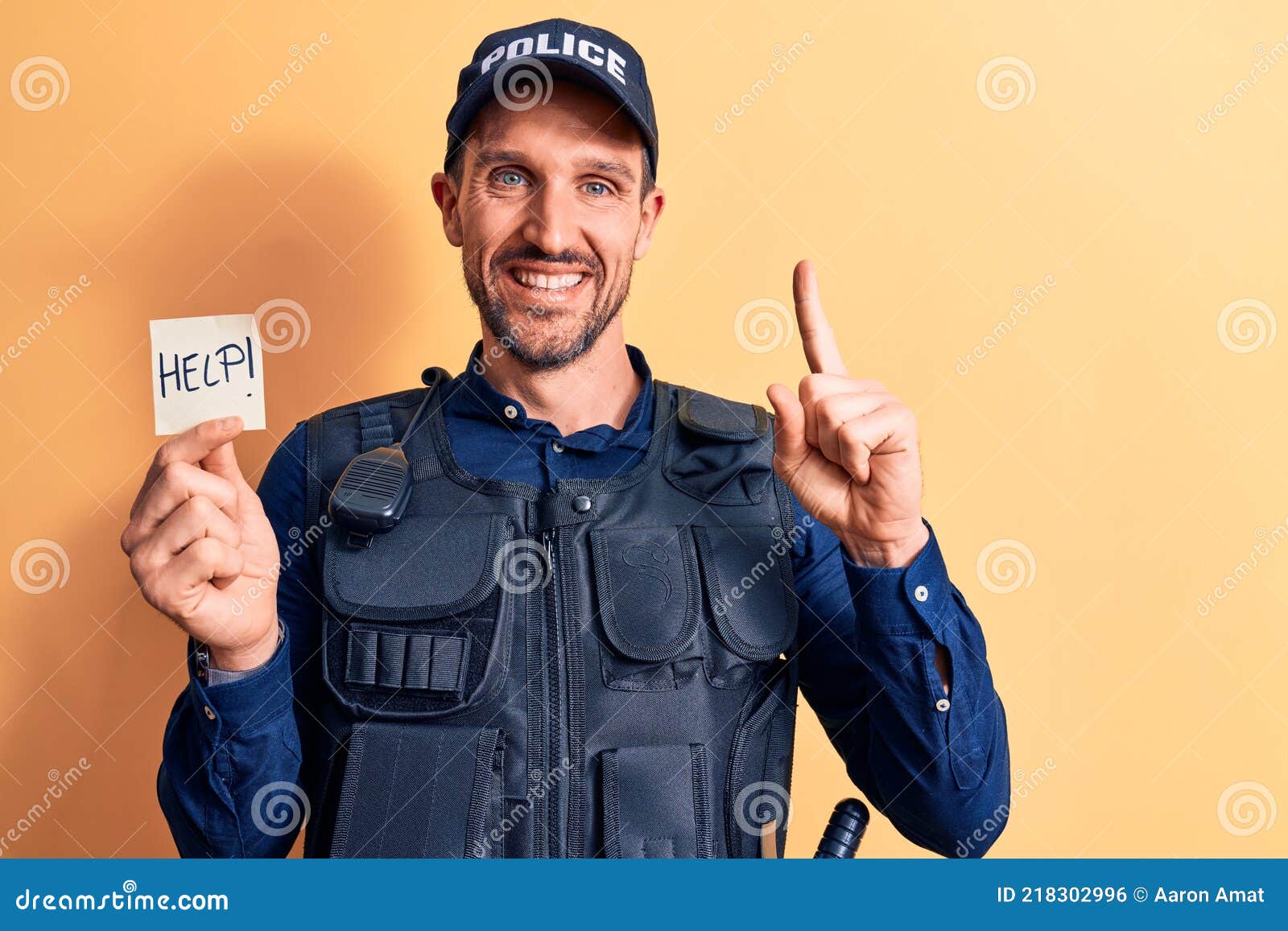 Handsome Policeman Wearing Uniform and Bulletprof Holding Reminder with ...