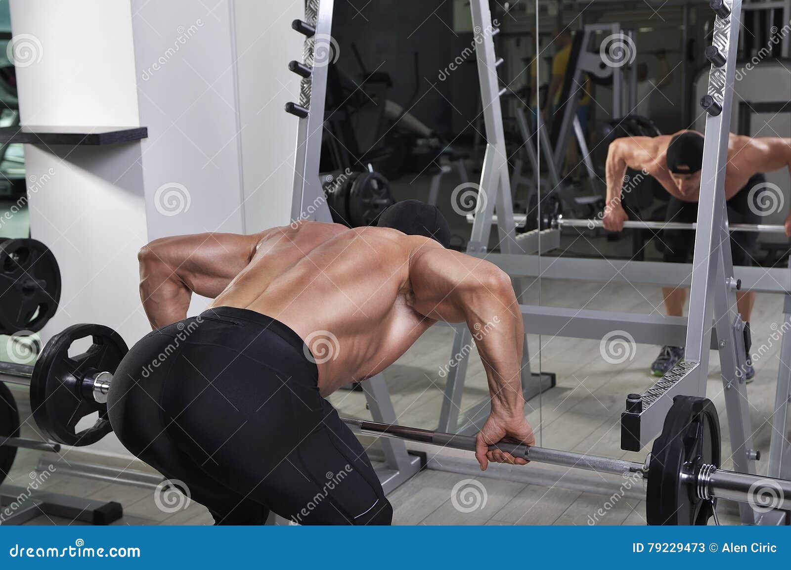 Handsome Powerful Athletic Man Doing Exercise for Back with Barbell ...