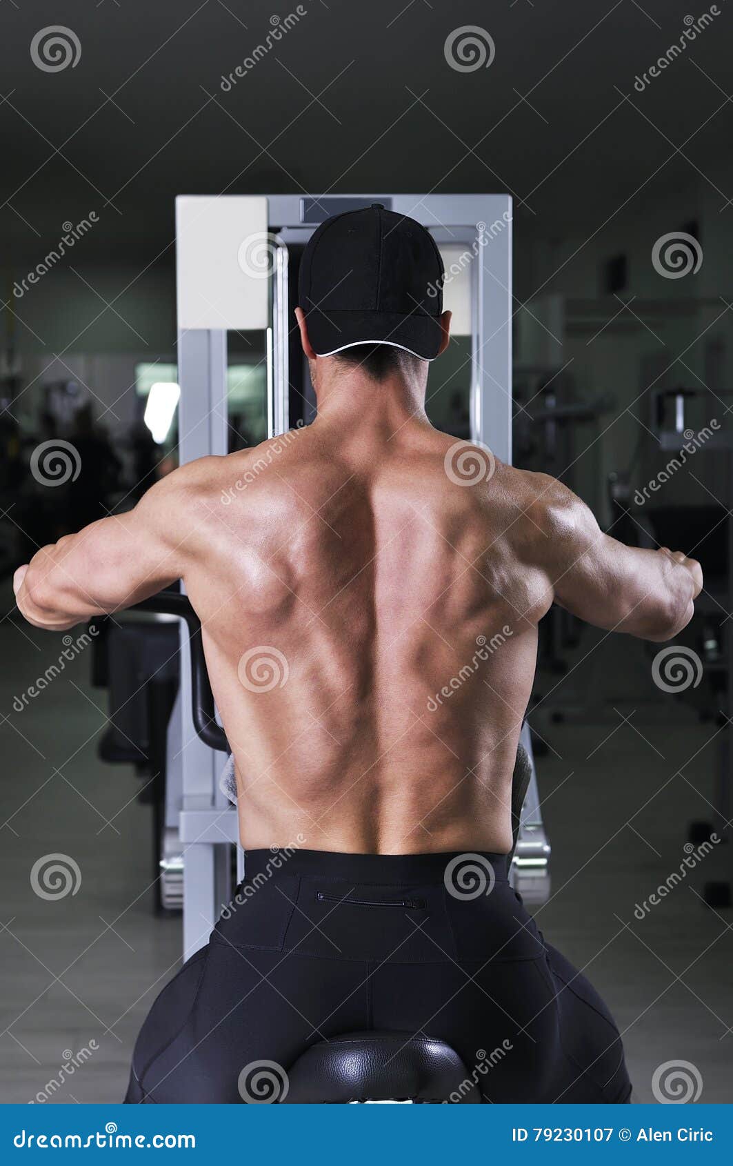 Handsome Powerful Athletic Man Performing Back Exercise. Stock Image ...