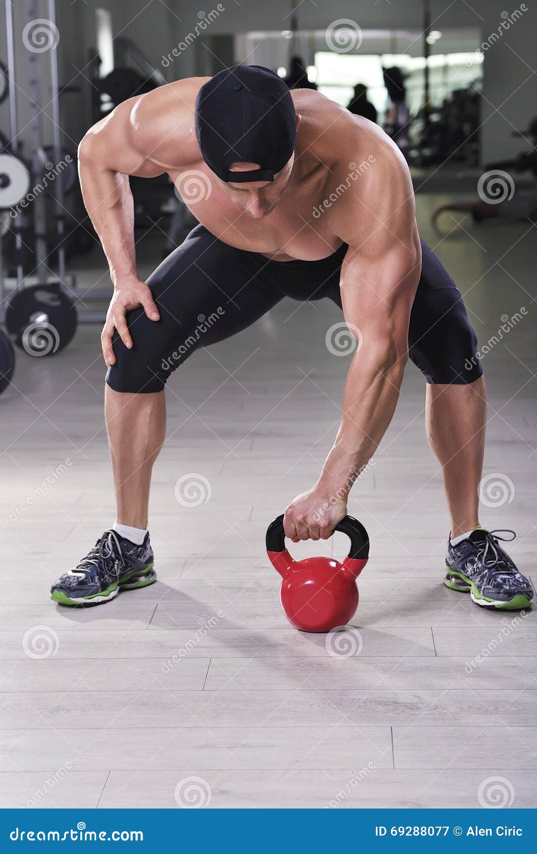 Handsome Powerful Athletic Man Performing Kettle Bell Exercise. Stock ...