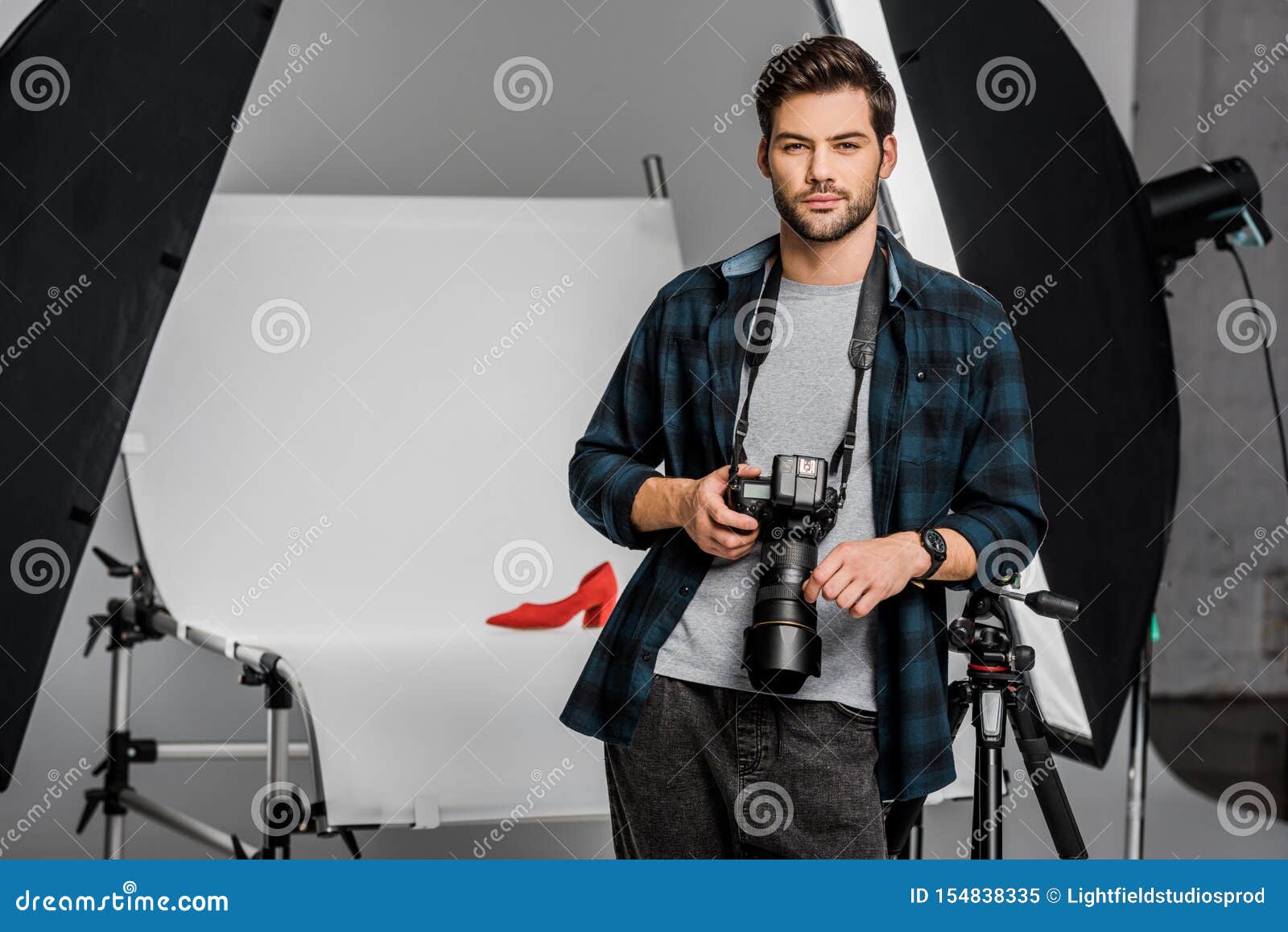Handsome Professional Young Photographer Looking at Camera Stock Image ...