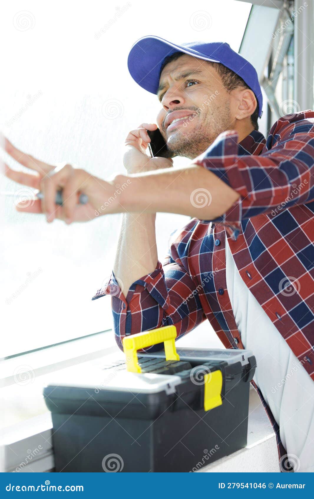 Handsome Repairman. Man Repairman Builder Work Clothes. Plan Repair ...