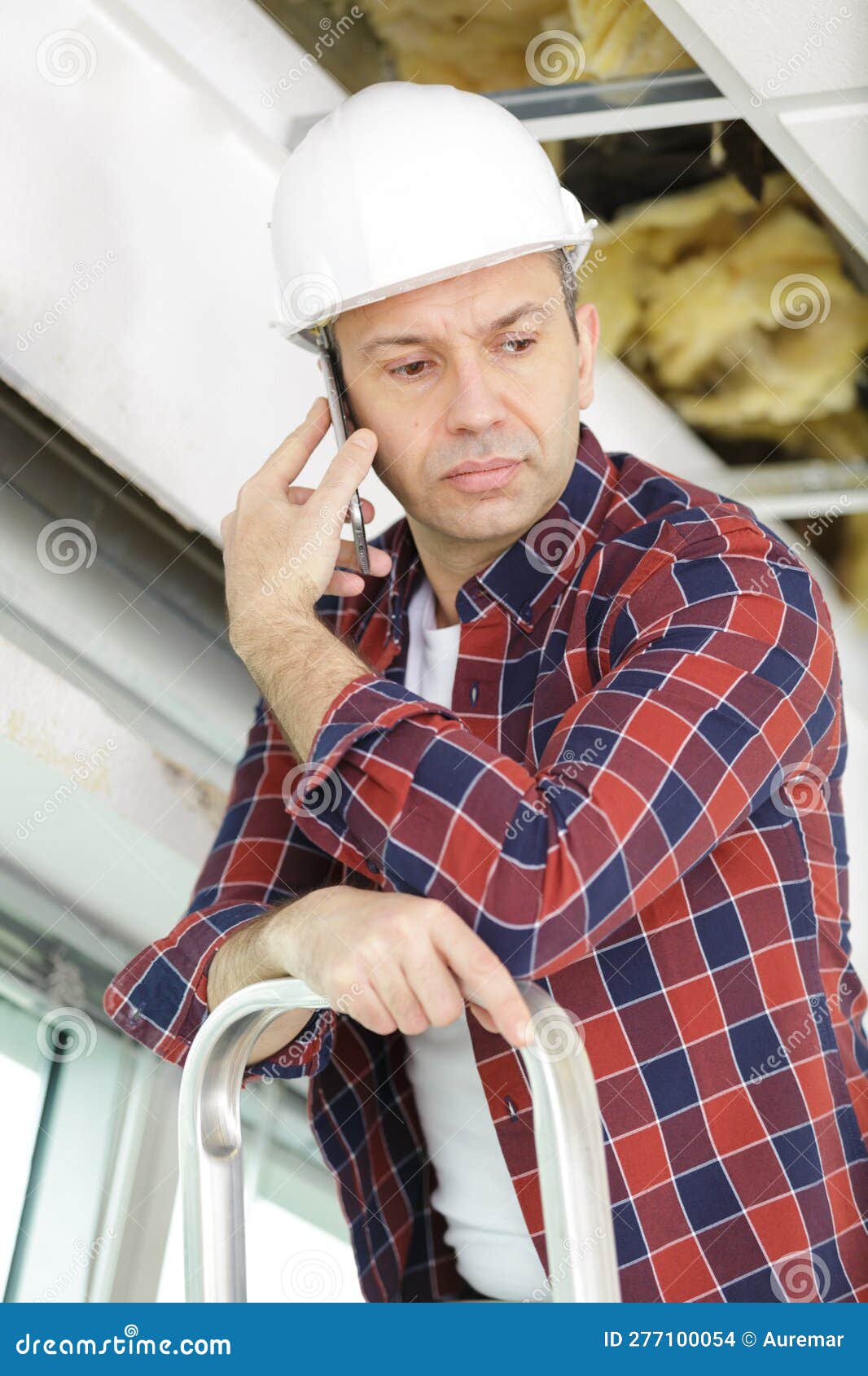 Handsome Repairman Using Mobile Phone while Standing in Ladder Stock ...