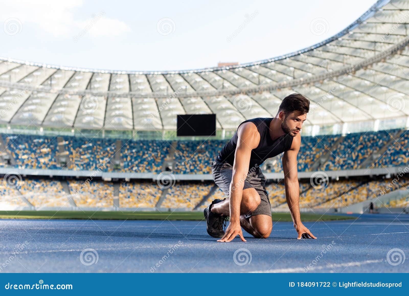 Handsome Runner in Start Position on Stock Photo - Image of runner ...