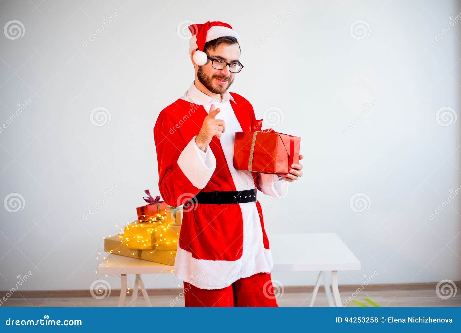 Handsome Santa Claus Giving Presents Stock Photo - Image of male ...