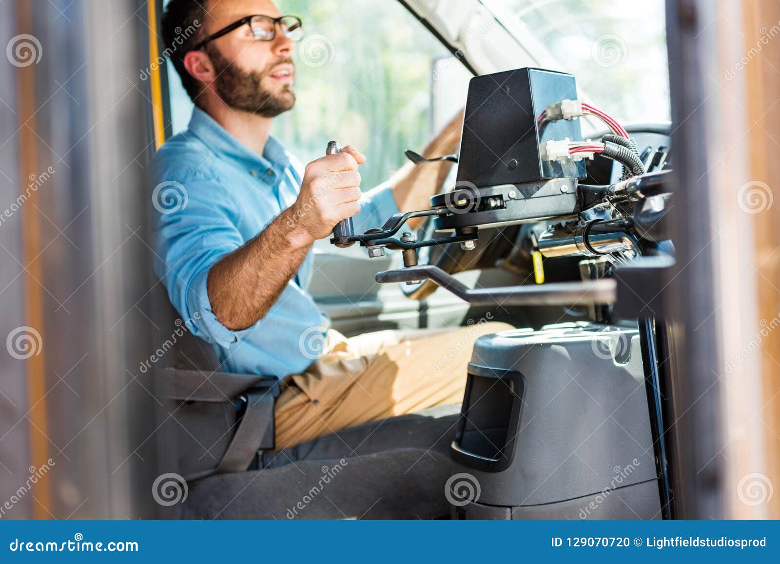 Handsome School Bus Driver Losing Door with Lever and Looking Stock ...