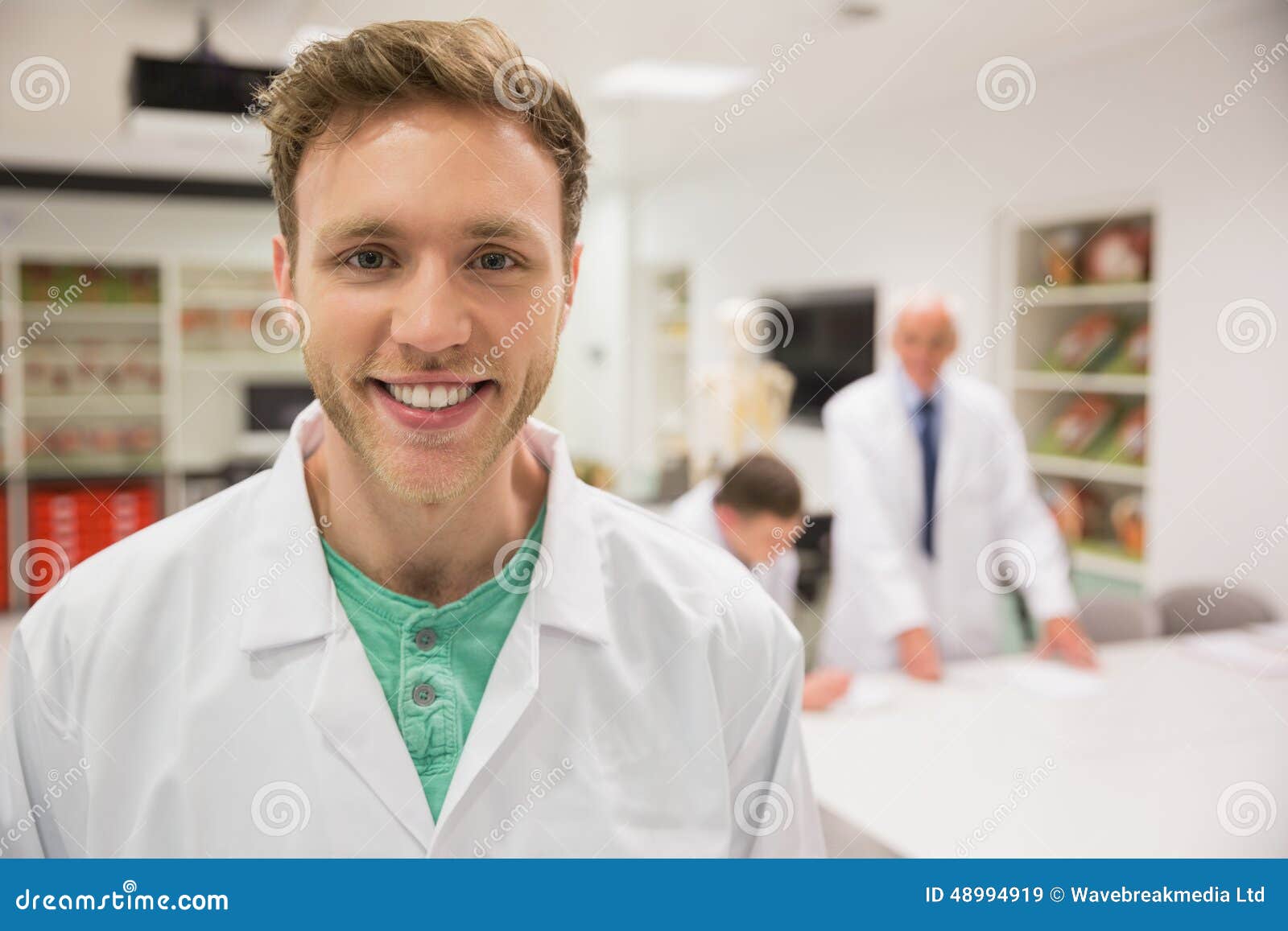 Handsome Science Student Smiling at Camera Stock Image - Image of ...