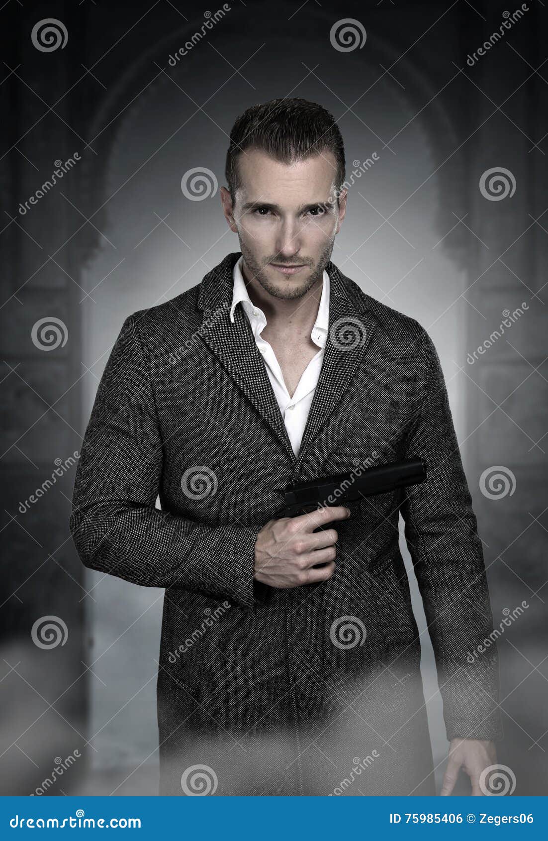 Handsome Secret Agent Holding a Gun Stock Photo - Image of secret ...