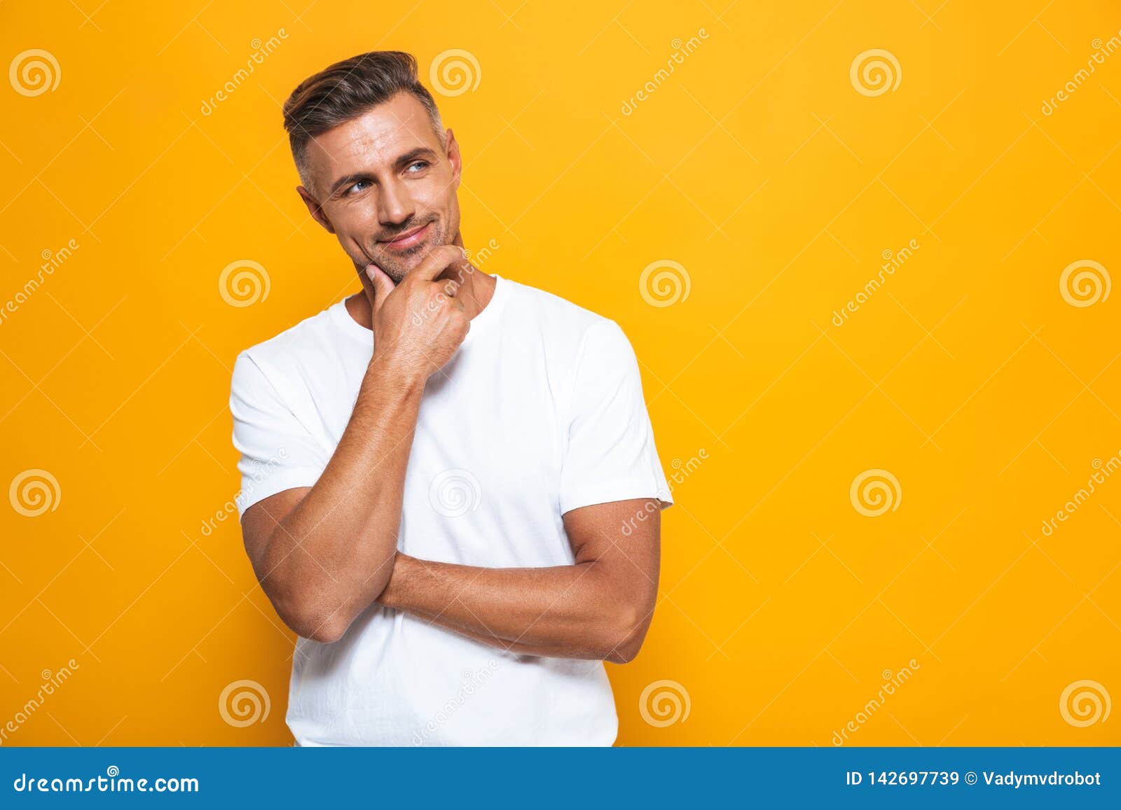 Handsome Serious Man Posing Isolated Over Yellow Wall Background Stock ...