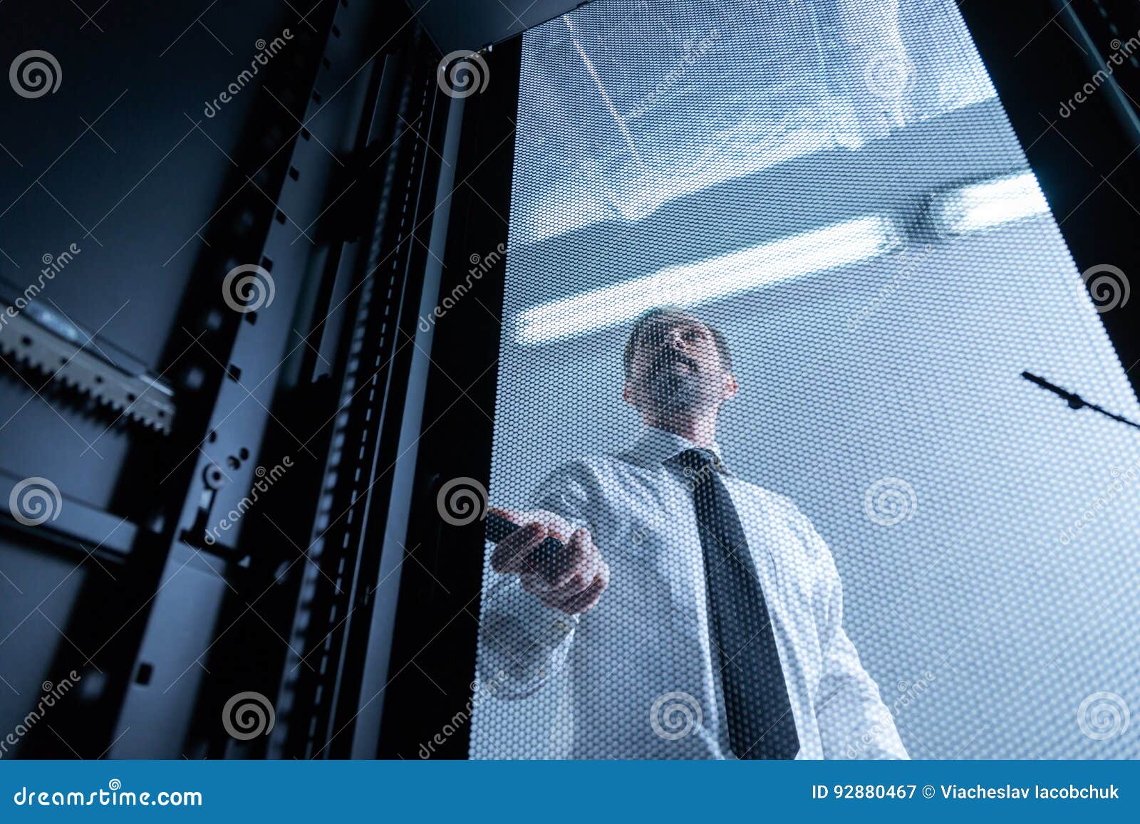 Handsome Serious Man Standing Behind the Metal Grid Stock Image - Image ...