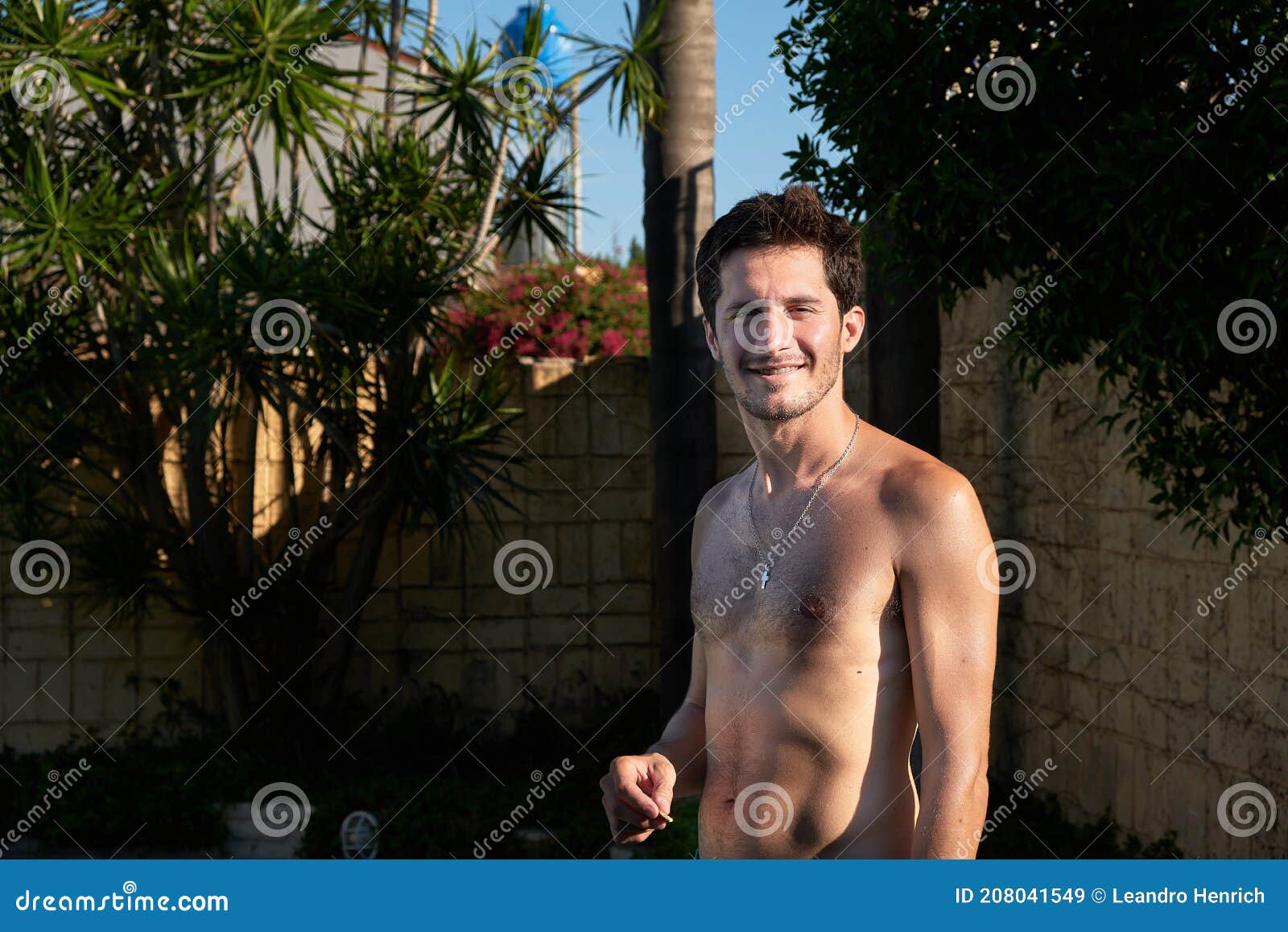 A Handsome Shirtless Man on the Backyard Sunbathing Stock Image - Image ...