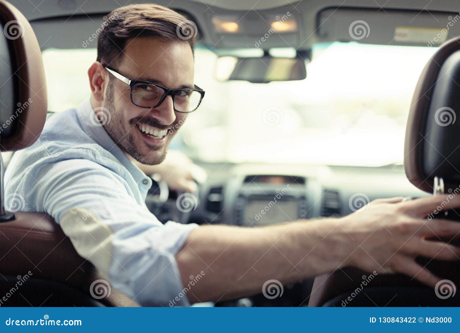 Handsome Businessman Driving a Car To Work Stock Photo - Image of ...