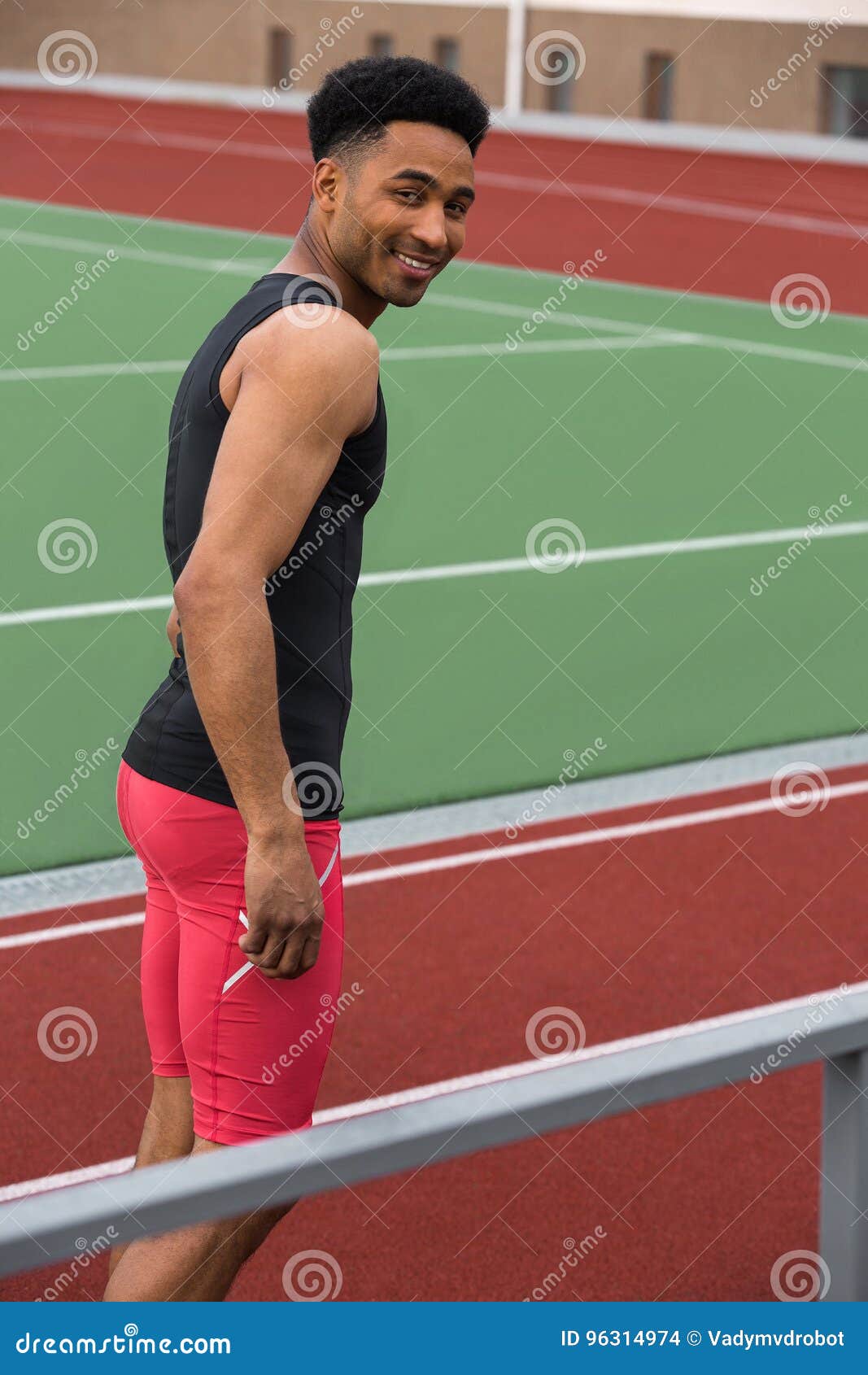 Handsome Smiling African Athlete Man on Running Track Stock Photo ...