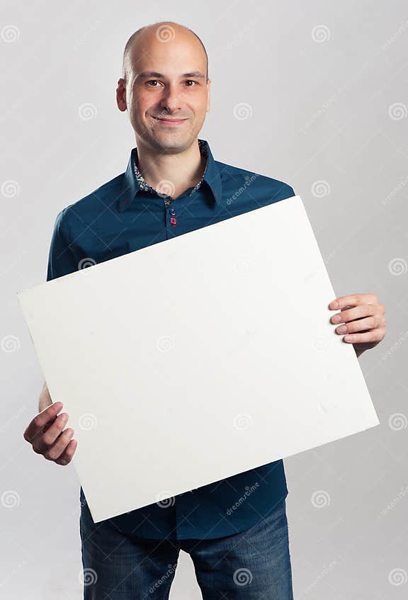Handsome Smiling Bald Man Presenting Empty Paper Sheet Stock Image ...