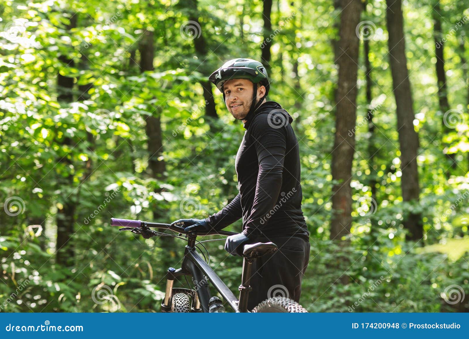 Handsome Smiling Cyclist Looking at Camera Over Forest Background Stock ...