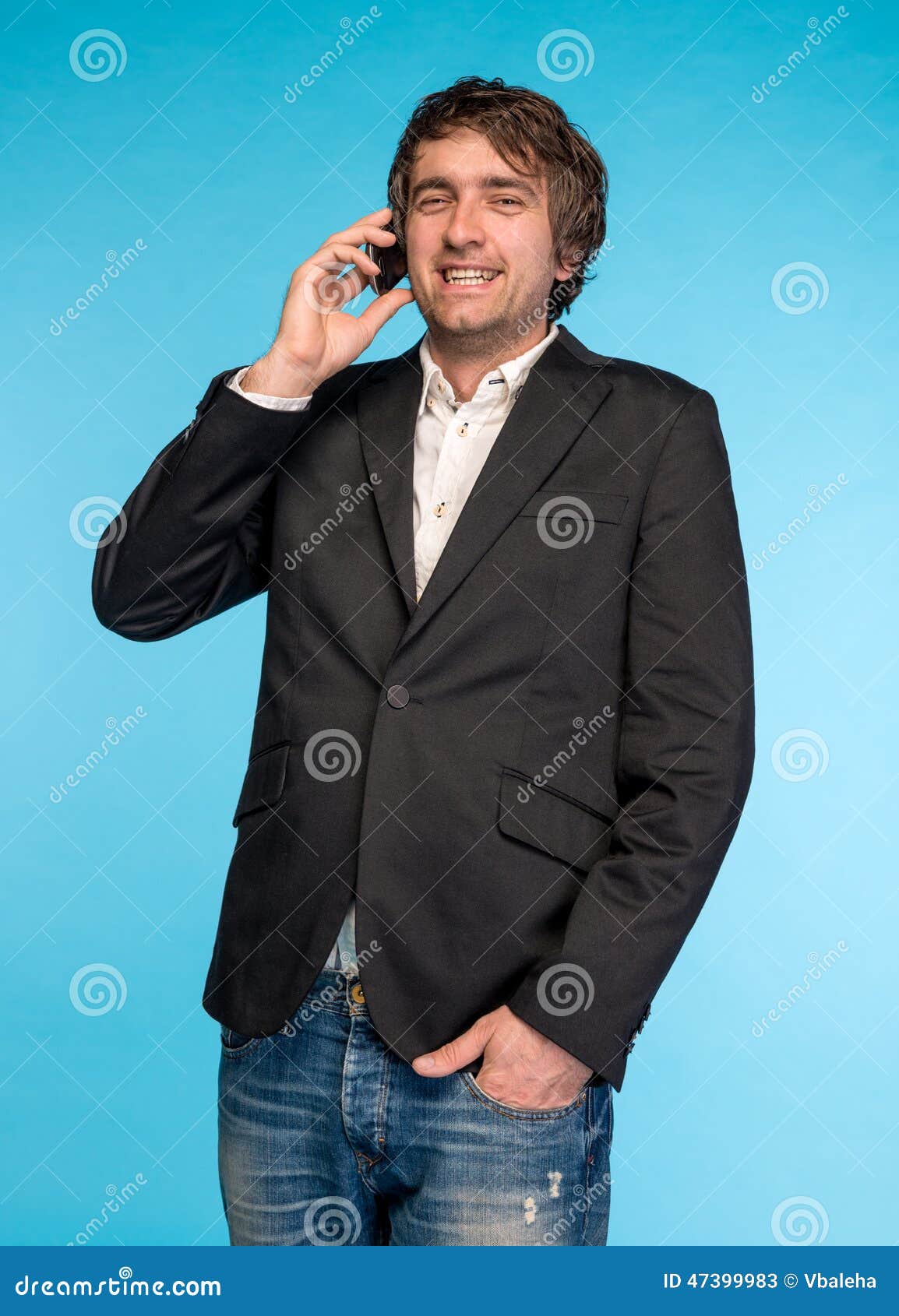 Handsome Smiling Man with Cell Phone Stock Image - Image of calling ...