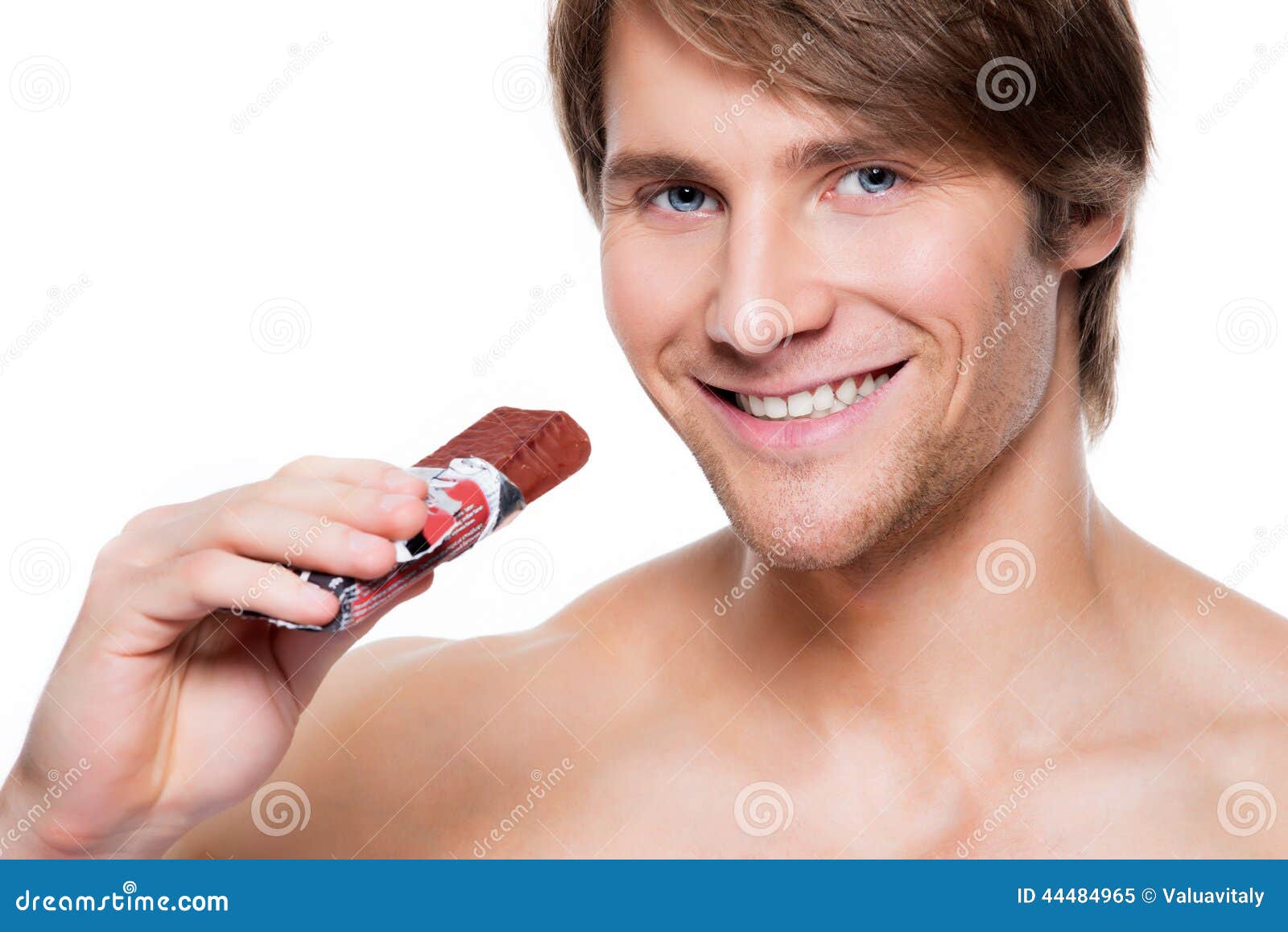 Handsome Smiling Man with Chocolate Bar. Stock Image - Image of ...