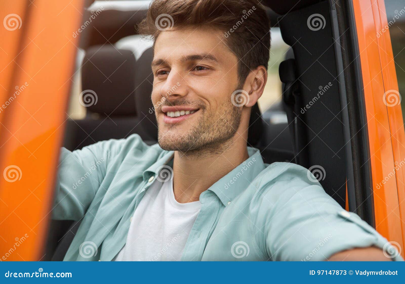 Handsome Smiling Man Sitting on a Front Seat Stock Image - Image of ...