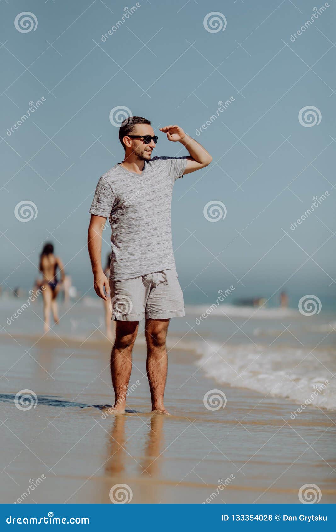 Handsome Smiling Man In Sunglasses Walking And Enjoying Day On The