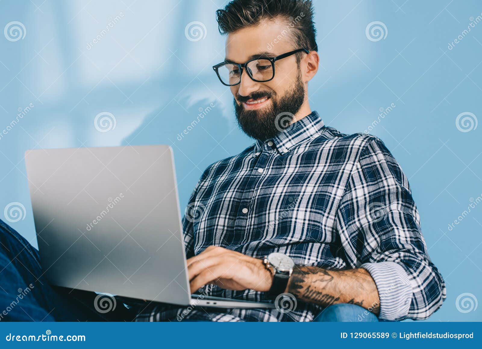 Handsome Smiling Man Using Laptop Stock Image - Image of handsome ...