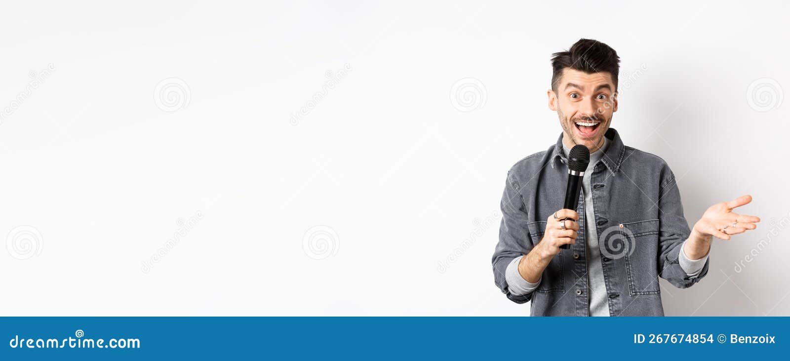 Handsome Smiling Performer Talking in Mic, Gesturing and Performing ...