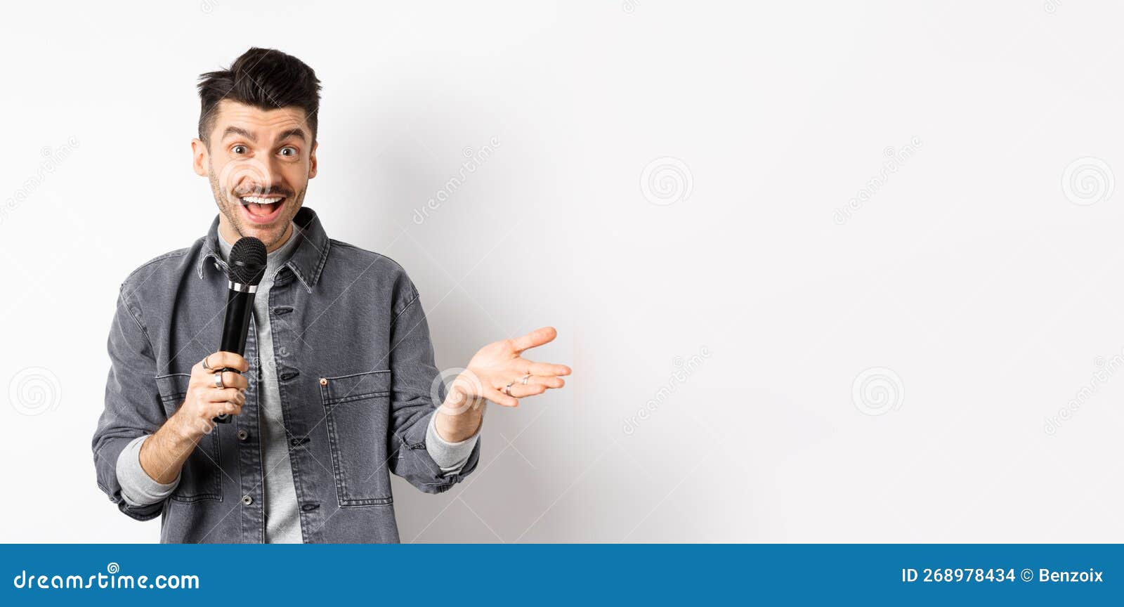 Handsome Smiling Performer Talking in Mic, Gesturing and Performing ...