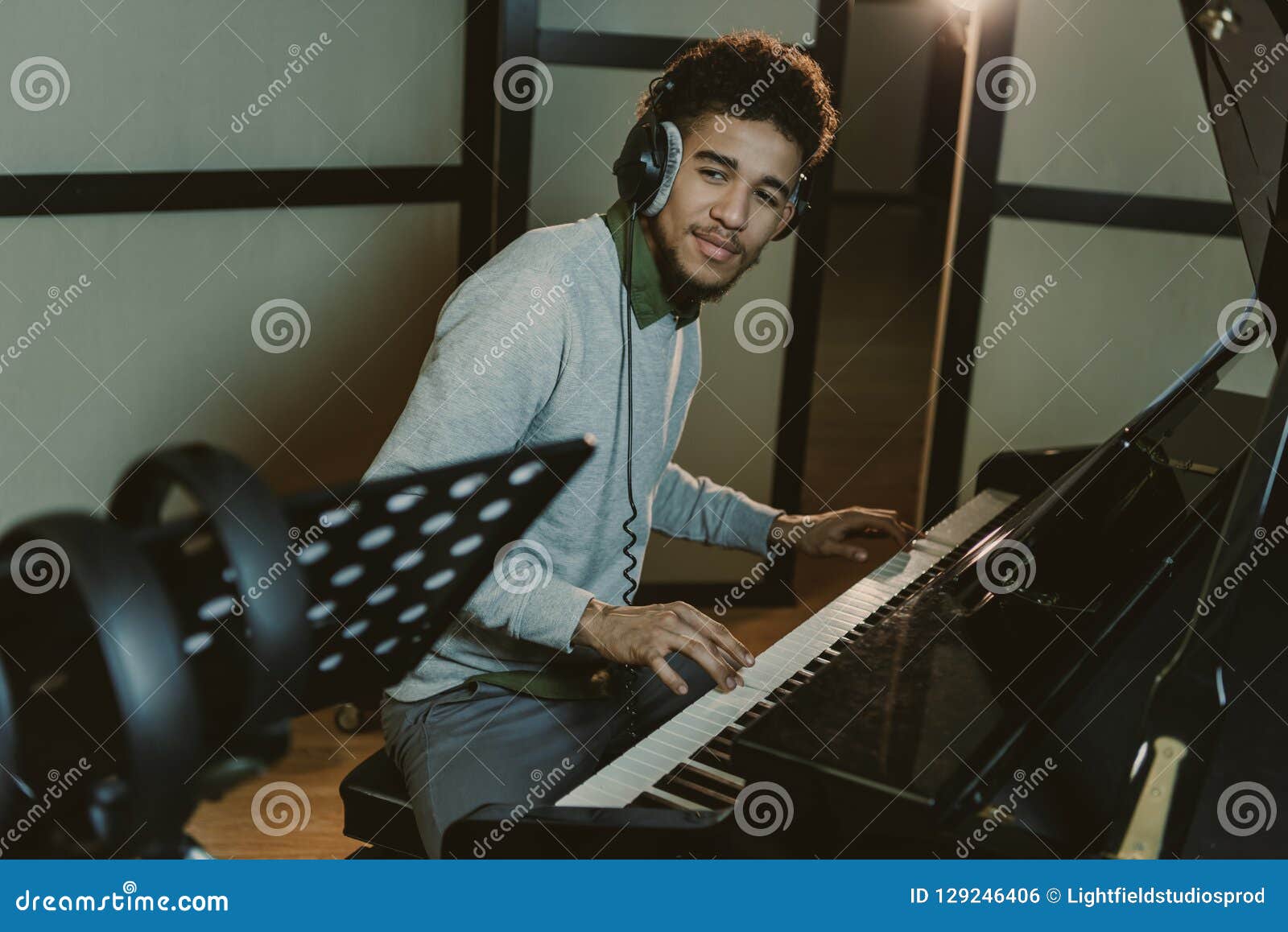 Handsome Smiling Piano Player Stock Photo - Image of pianokeys, person ...