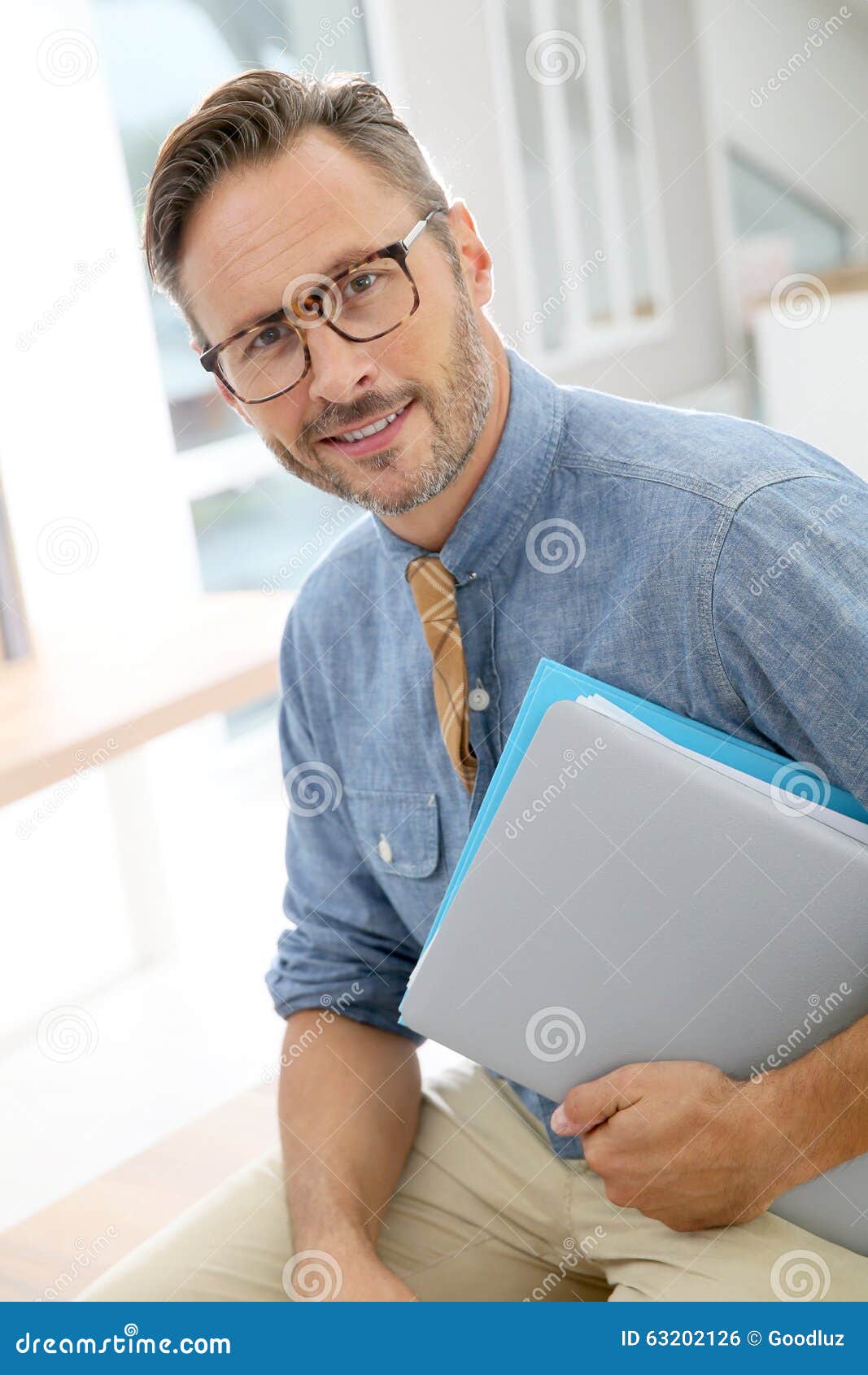 Handsome smiling professor stock photo. Image of camera - 63202126
