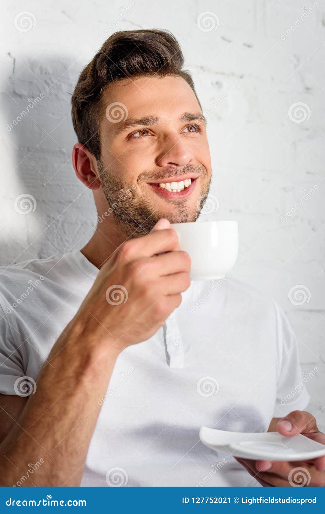 Handsome Smiling Young Man Drinking Coffee at Morning Stock Image ... Handsome Smiling Young Man Drinking Coffee at Morning Stock Image ...