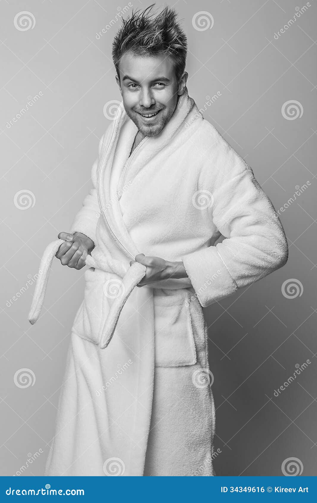 Handsome Smiling Young Man in Luxurious Bathrobe. Stock Photo - Image ...