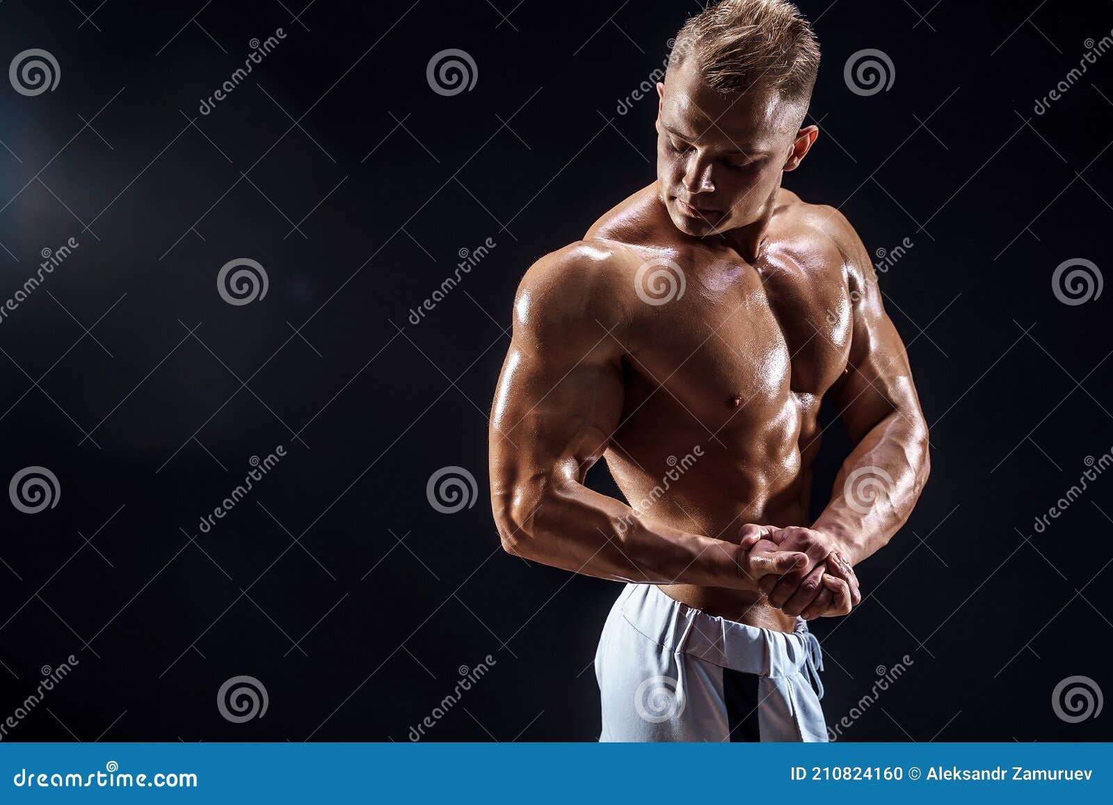 Handsome Strong Bodybuilder Posing in Studio Stock Photo - Image of ...