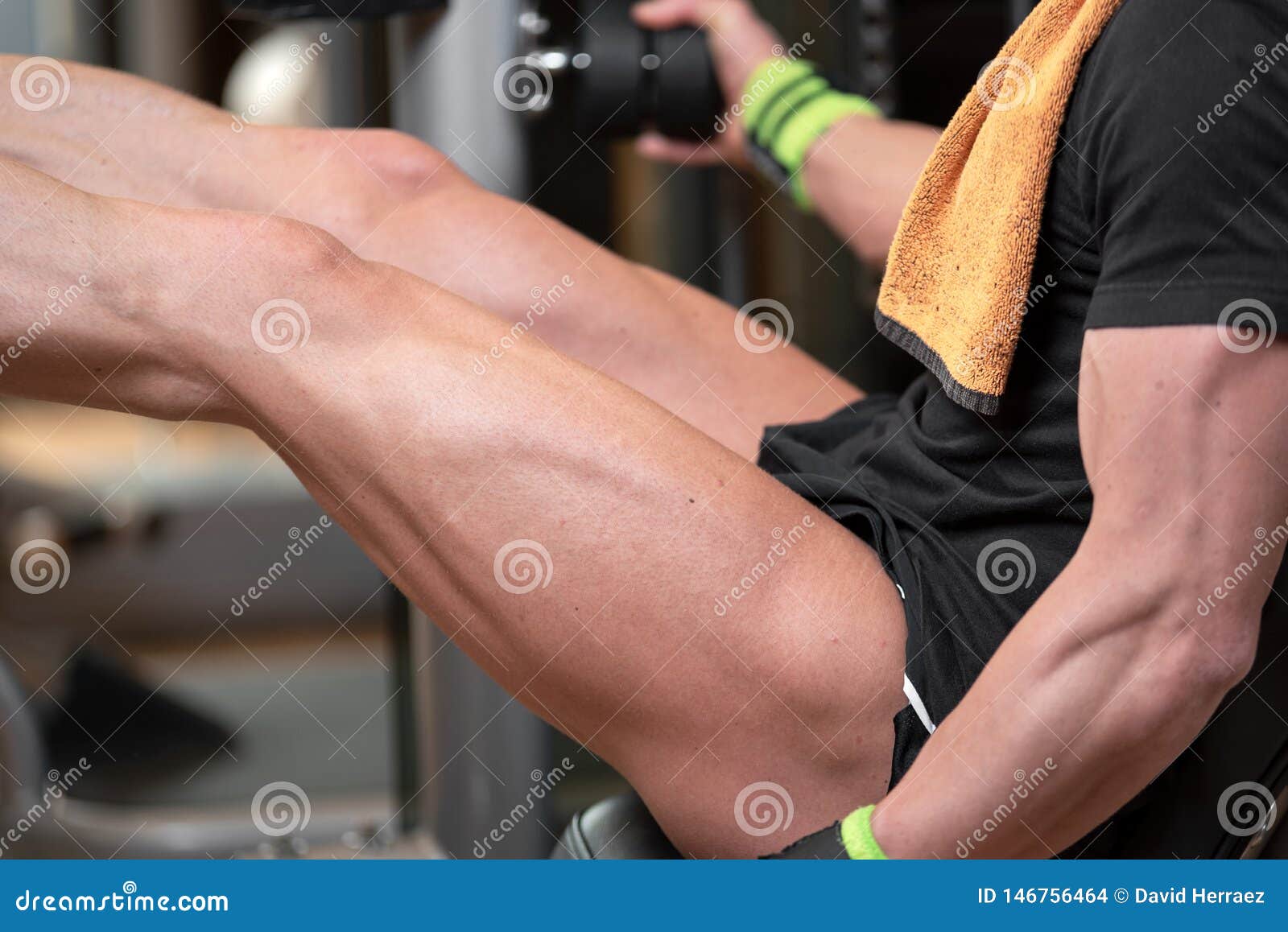 Handsome Strong Man Performed Leg Press Workout in the Gym. Stock Photo ...